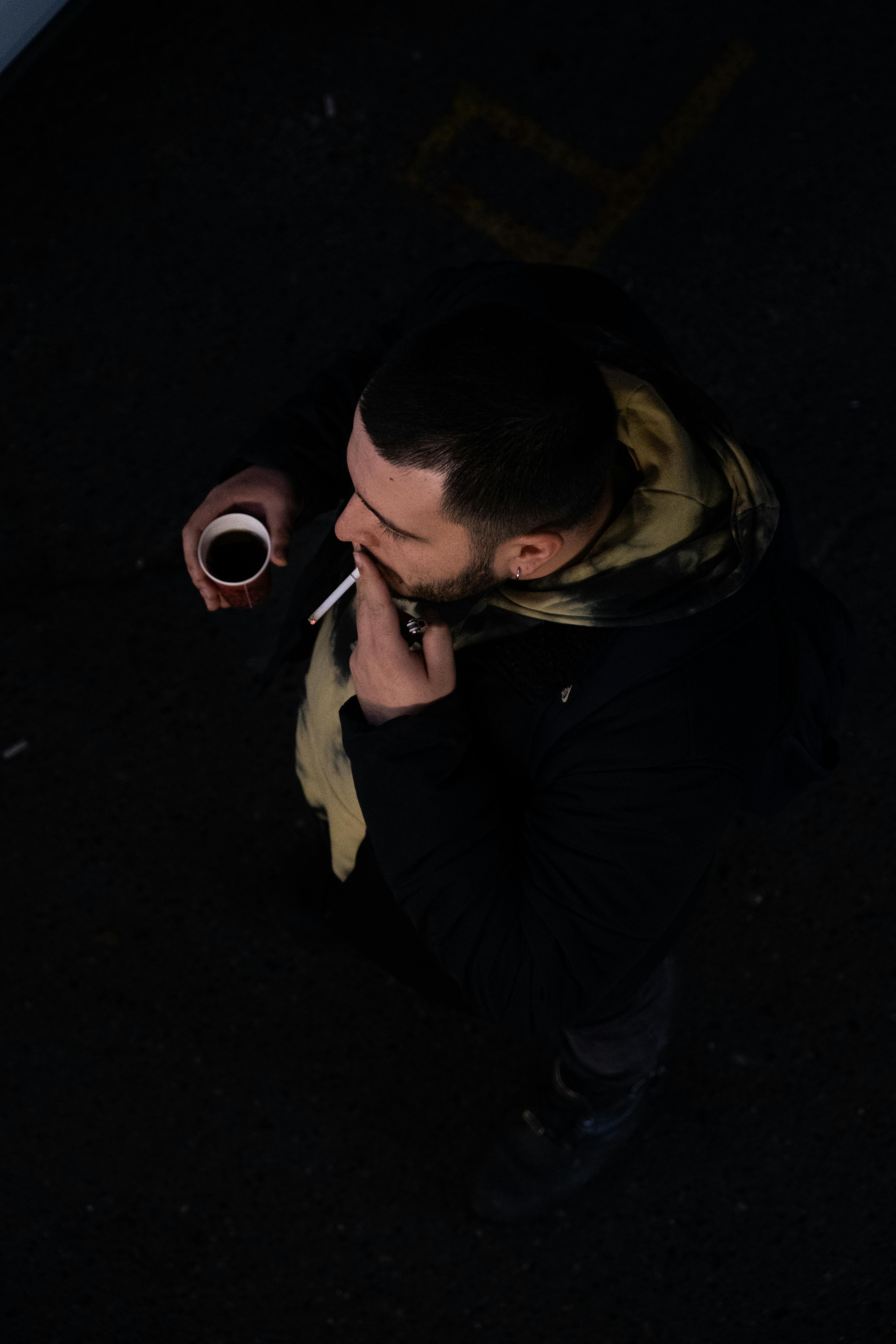 Man Holding Logic Vape Pens in Hands · Free Stock Photo