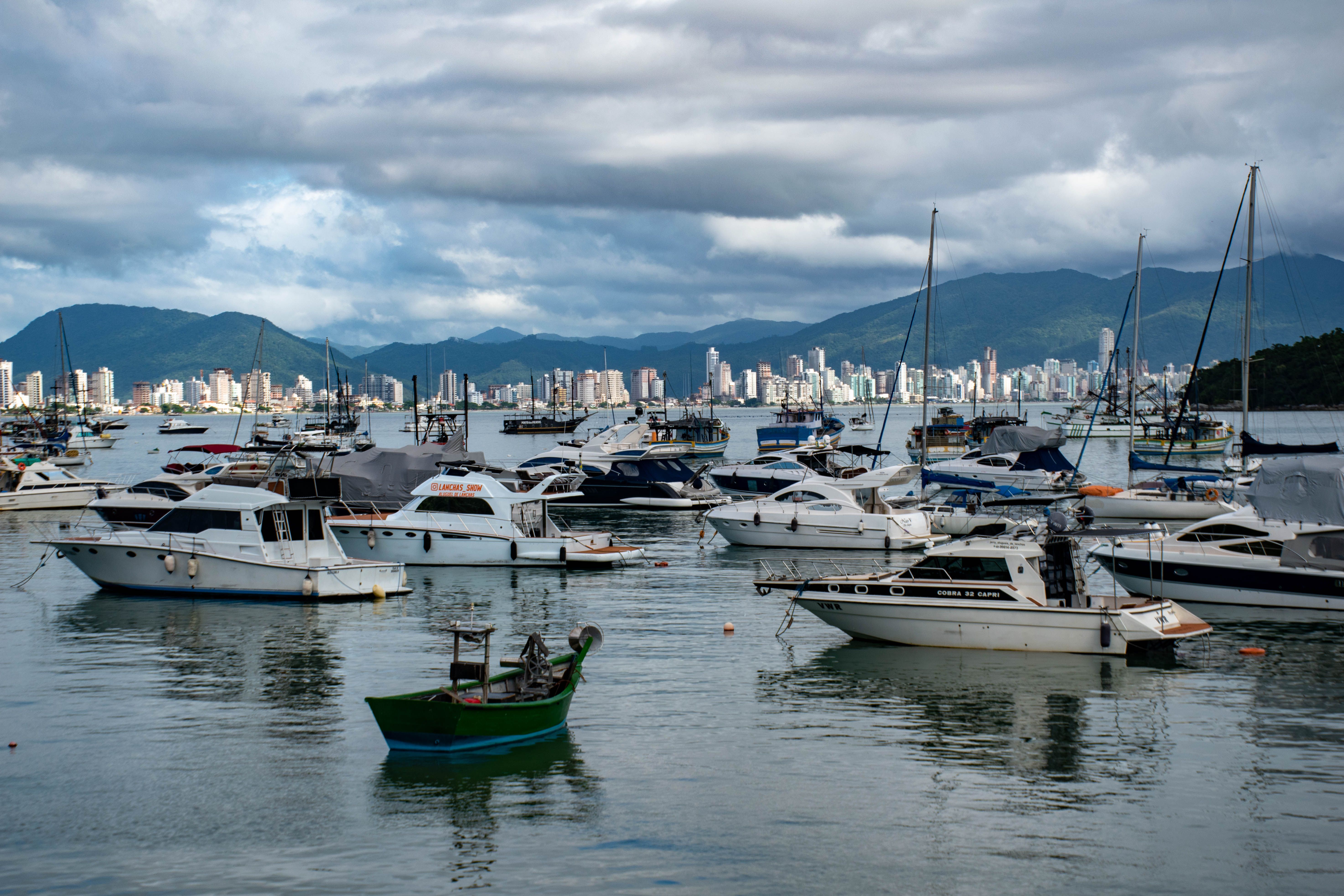 Boats in the Marina and a Modern City Skyline in the Background · Free ...