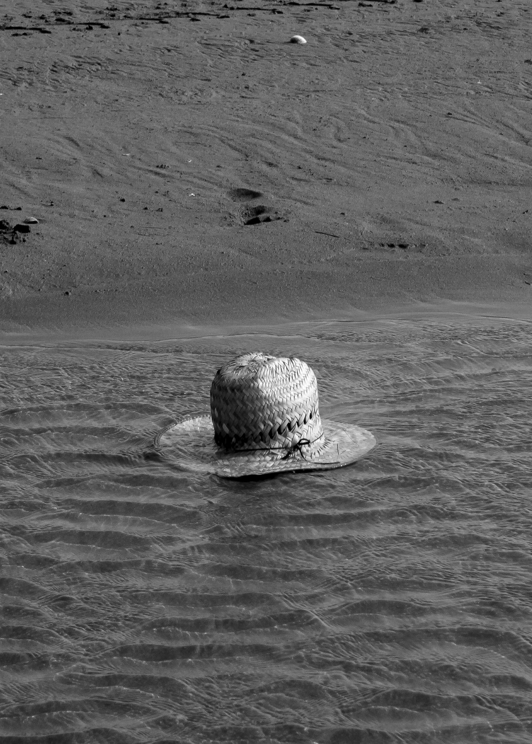 Straw Hat on a Beach · Free Stock Photo