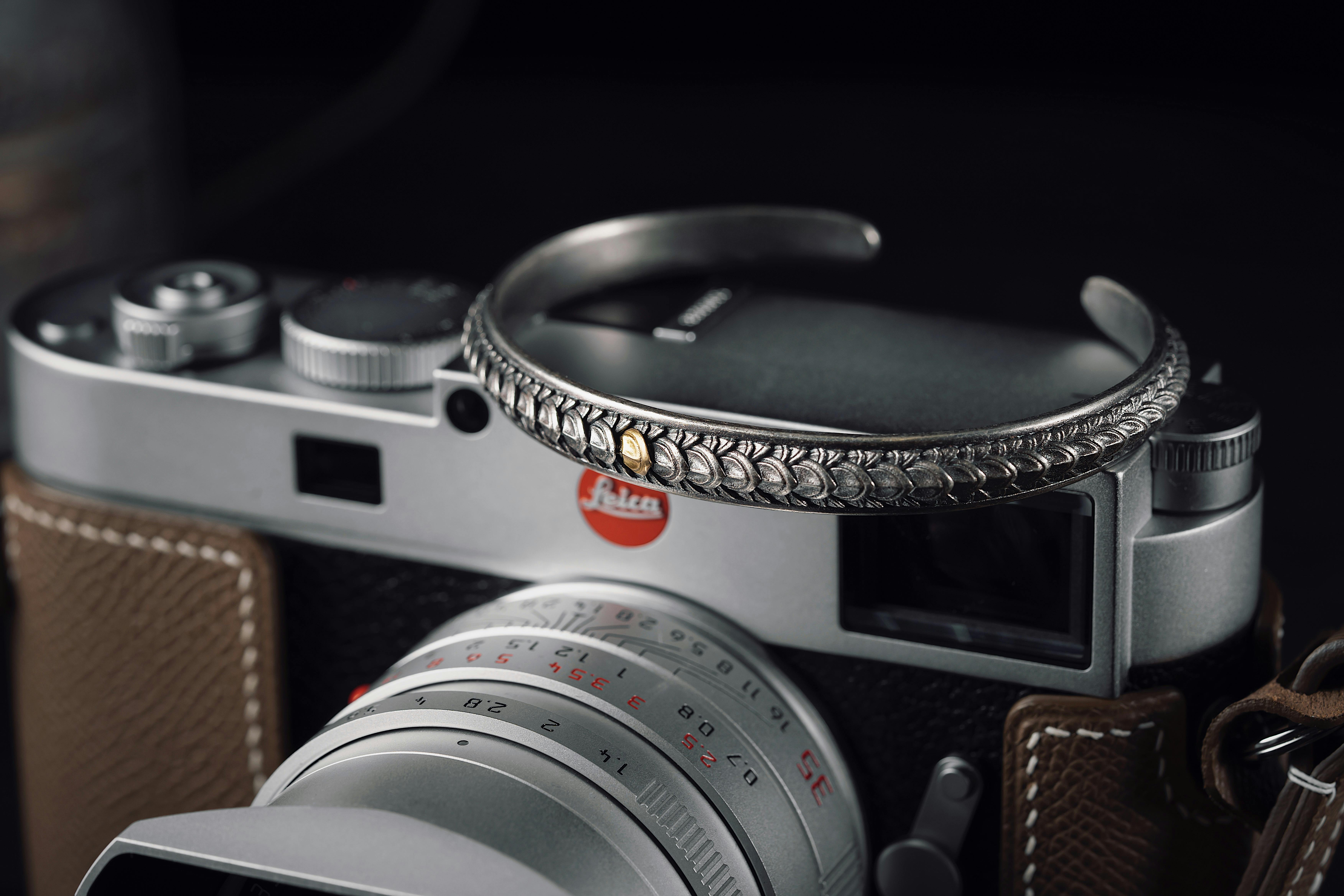 Silver Bracelet on a Camera · Free Stock Photo