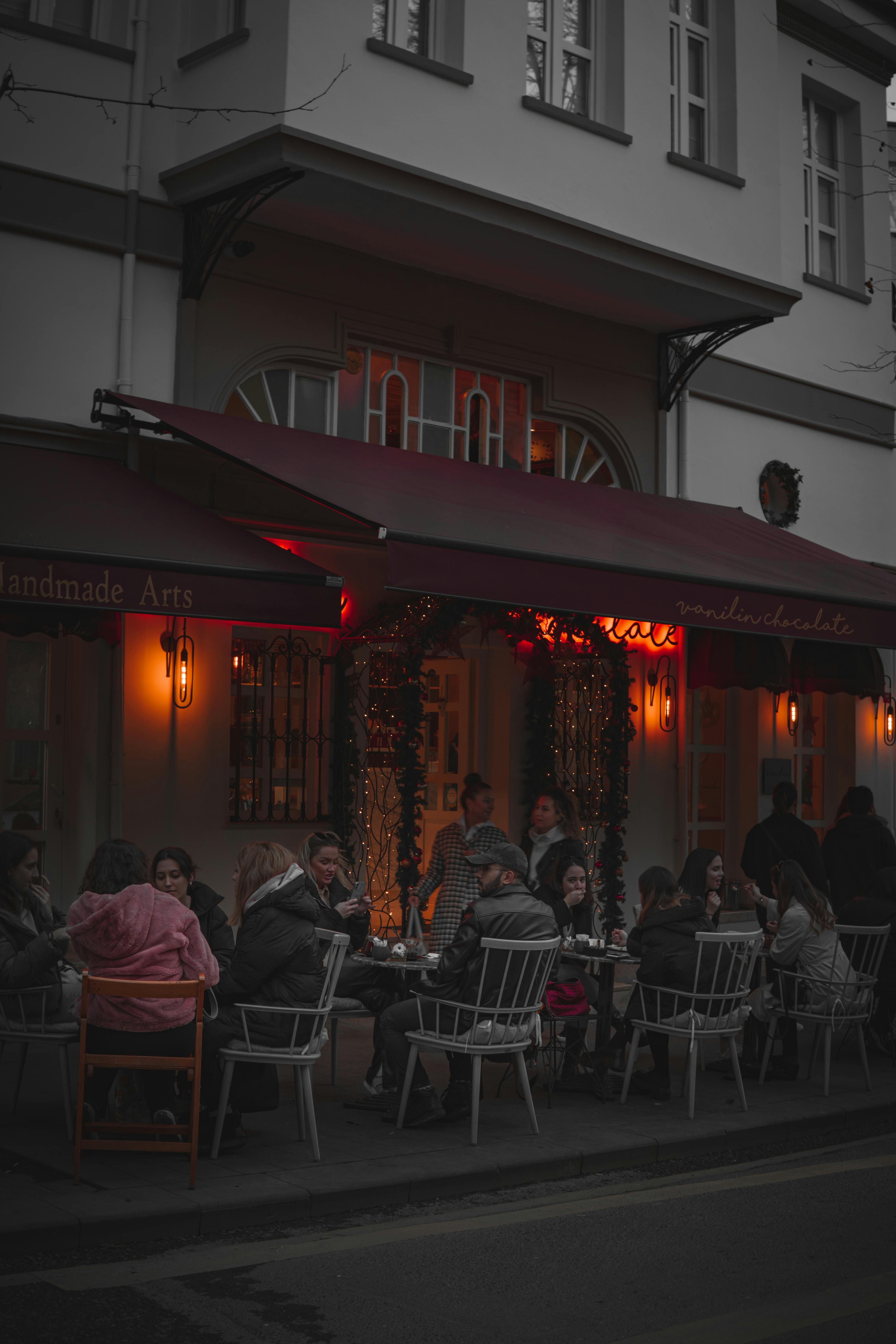 People at Cafe in Evening · Free Stock Photo