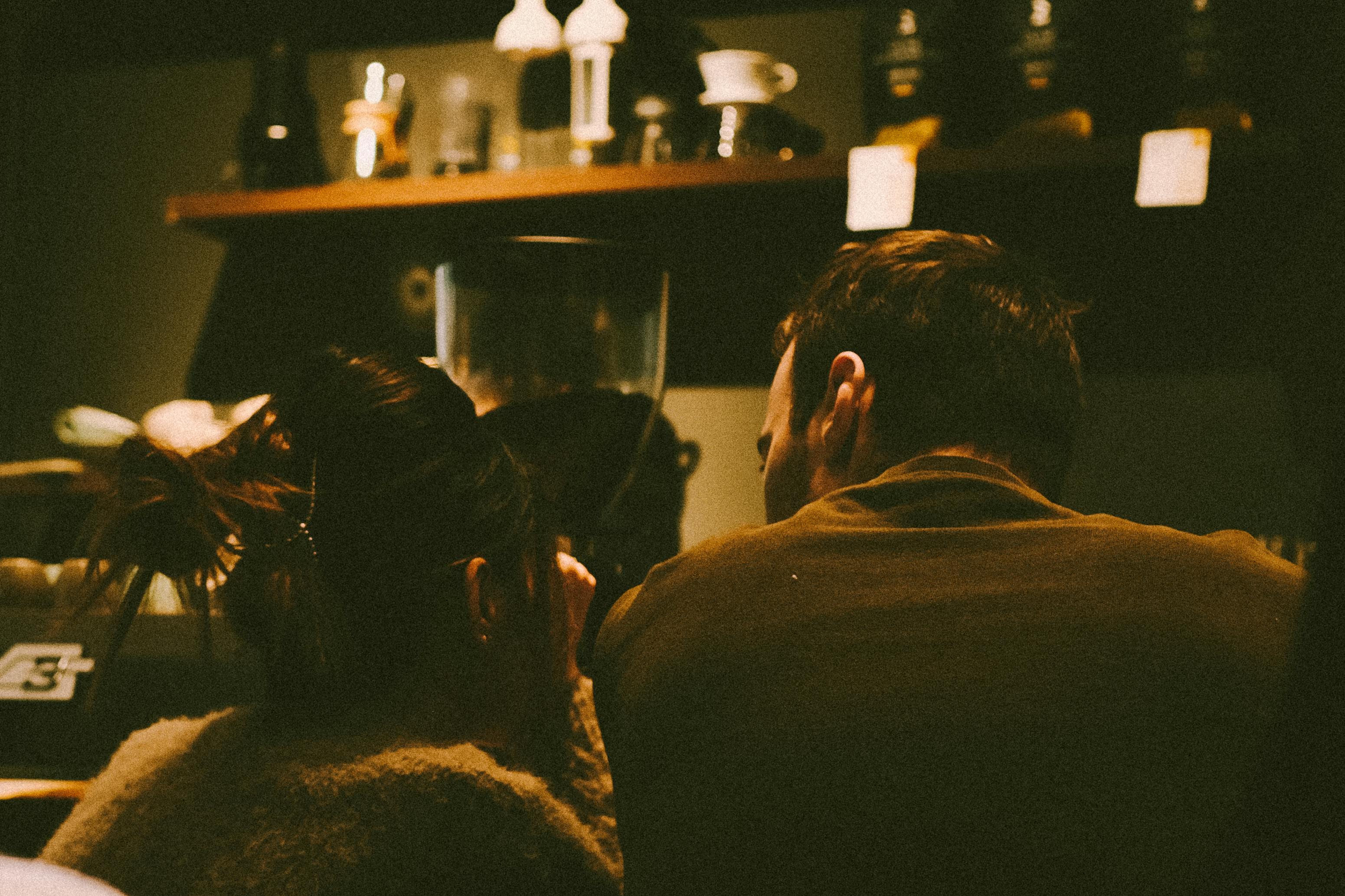 Back View of Couple at Bar · Free Stock Photo