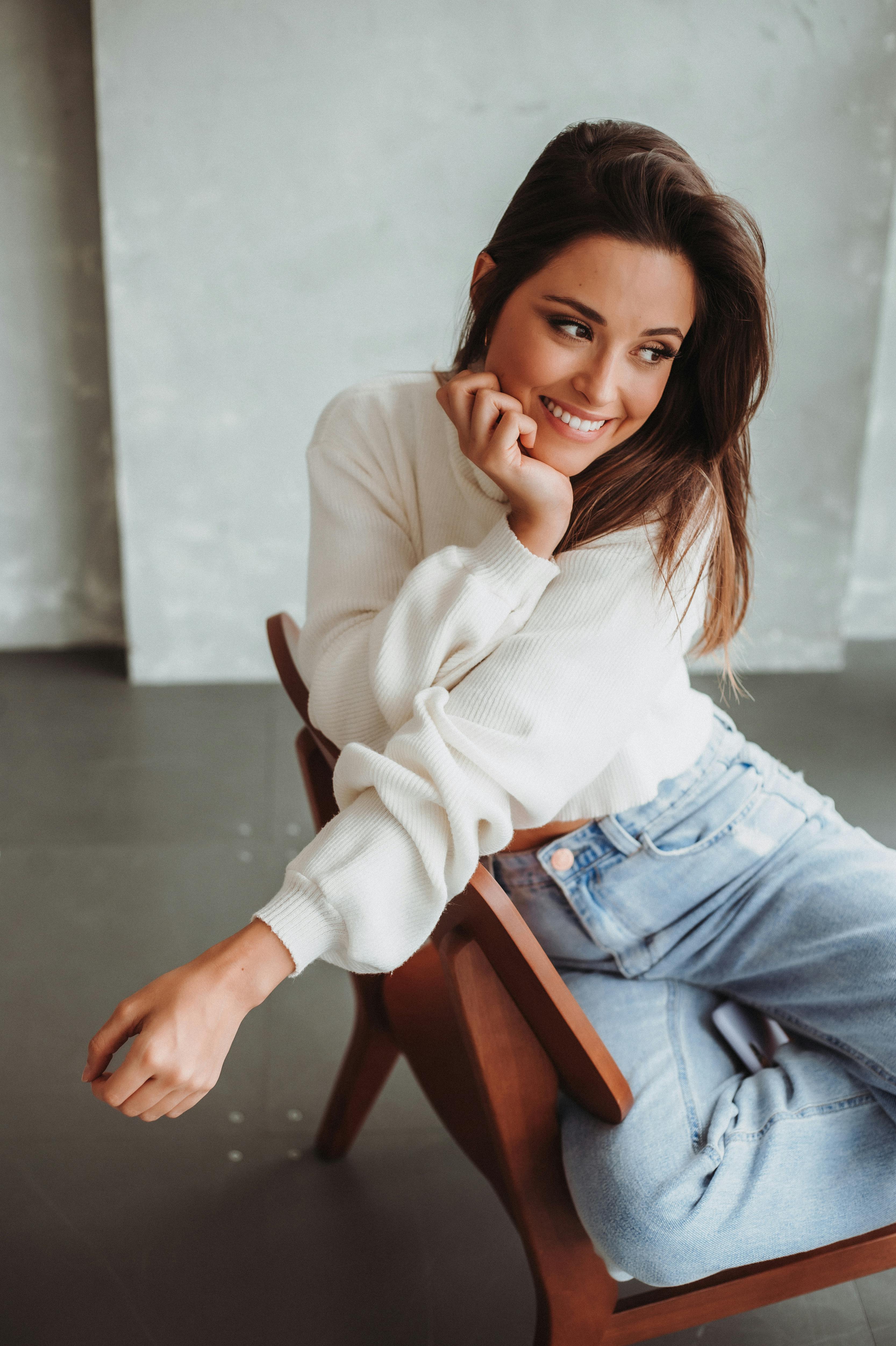 Woman Posing on Chair · Free Stock Photo