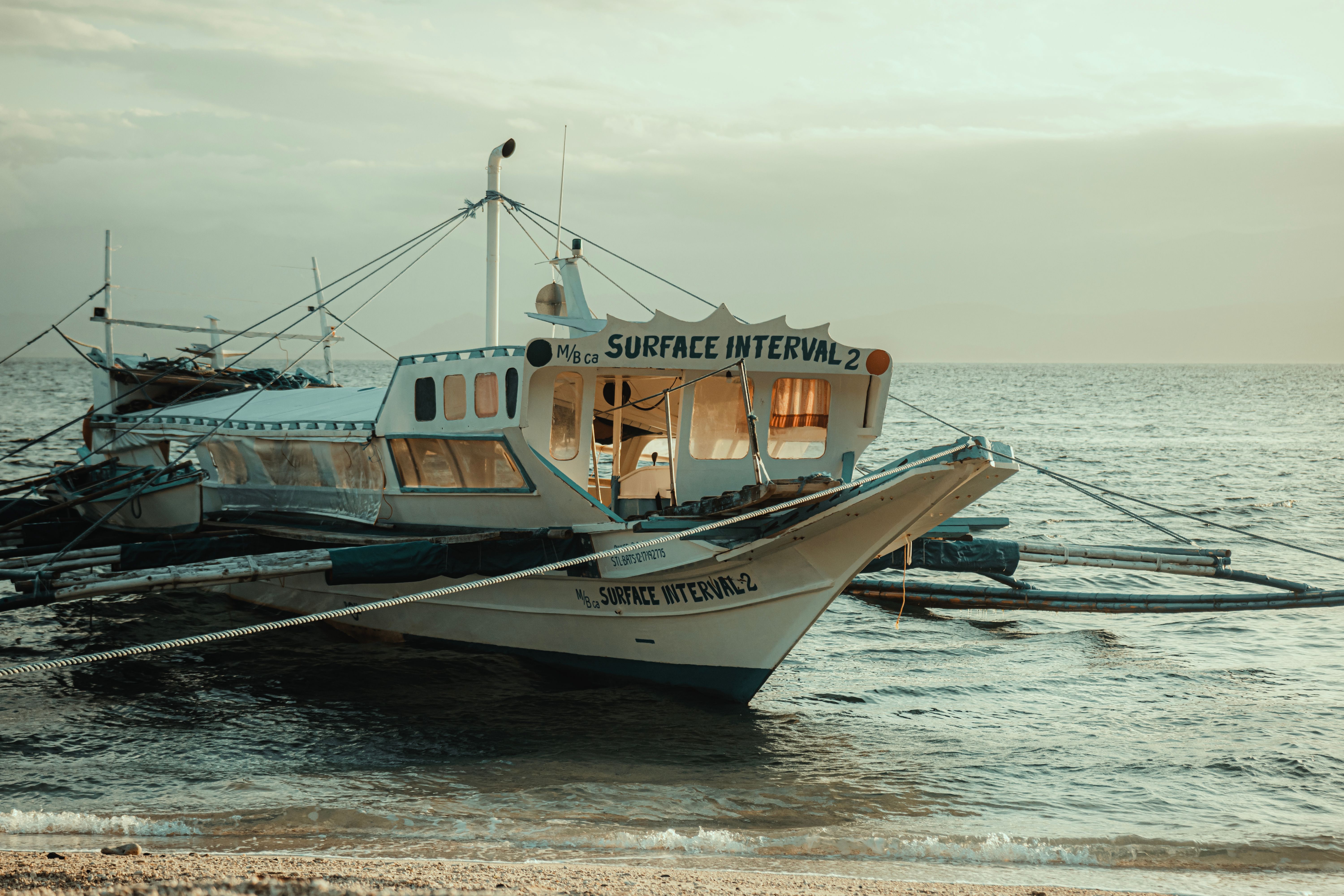 Boat Near Beach · Free Stock Photo