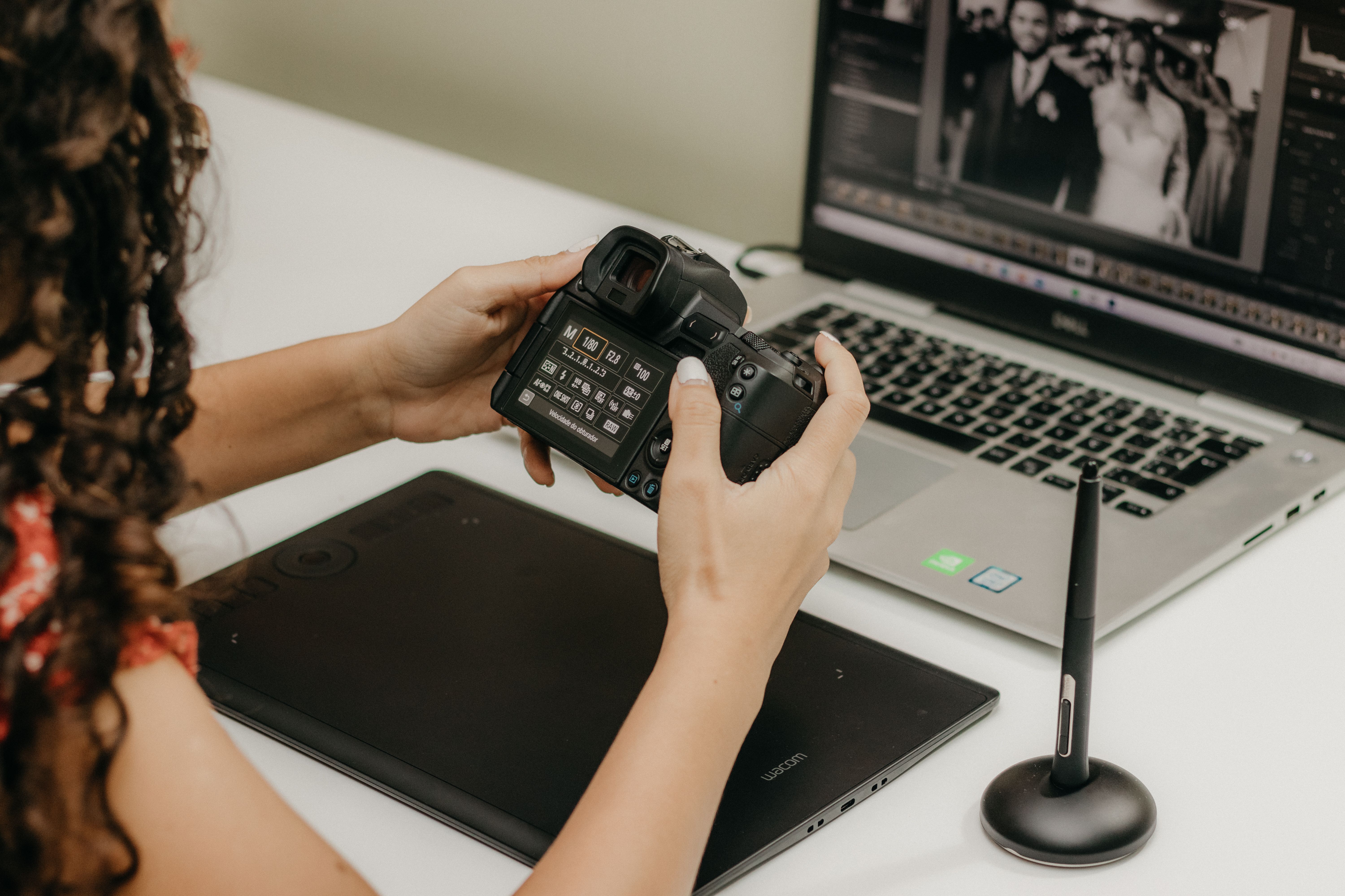 Person Holding Photo Near Camera · Free Stock Photo
