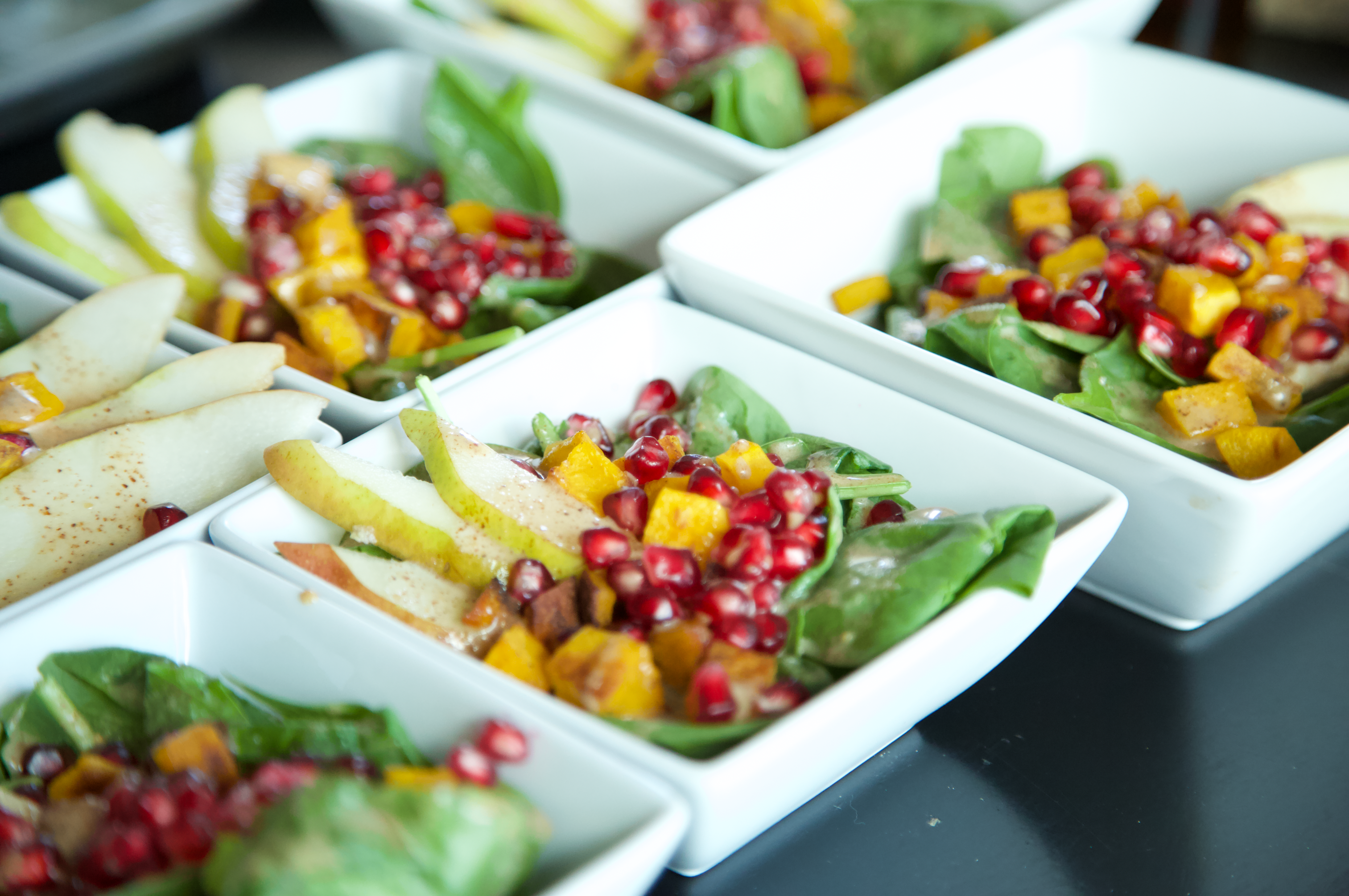 Salad Bowl and Canapes on a Table · Free Stock Photo