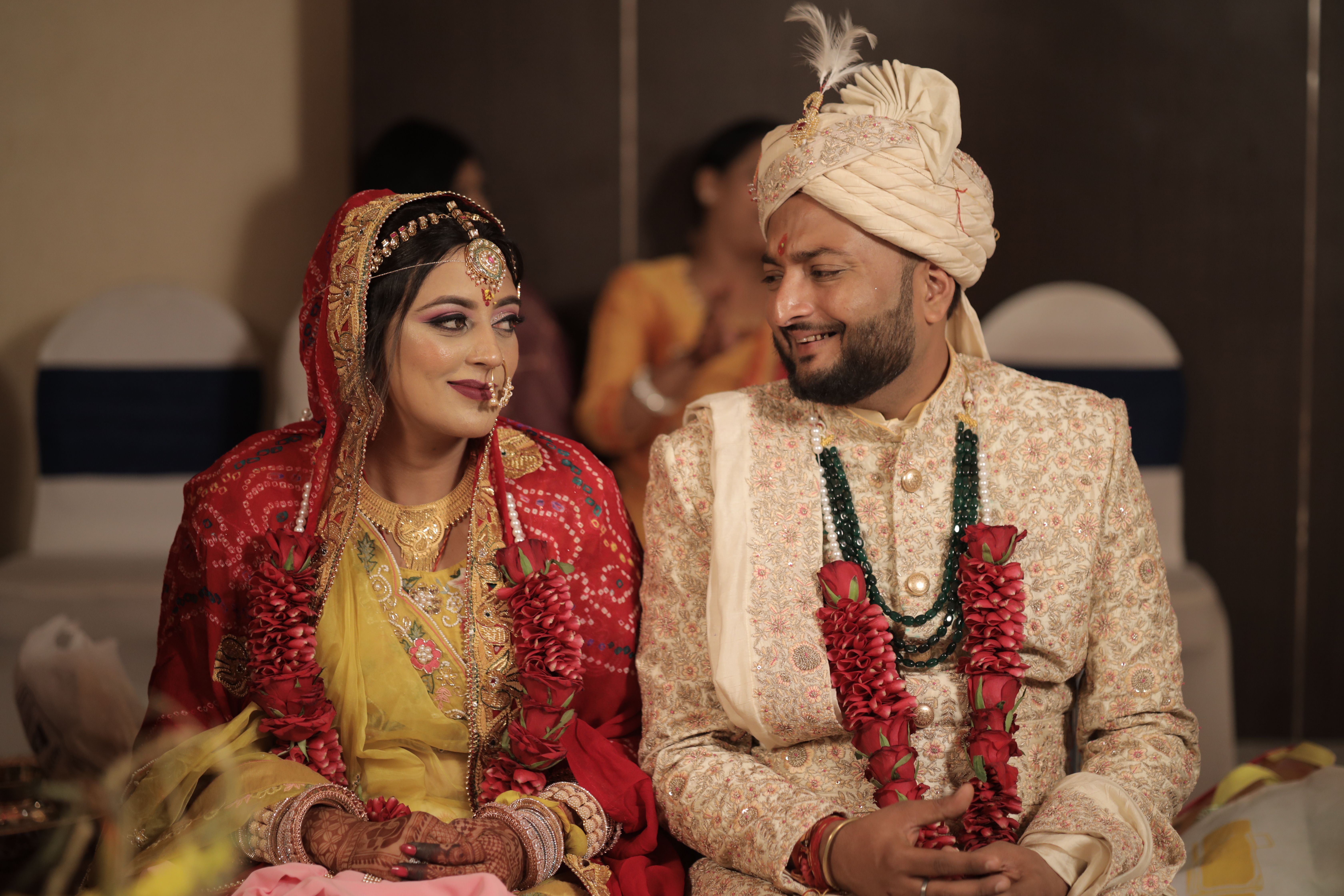 Bride and the Groom Sitting Together Side by Side · Free Stock Photo
