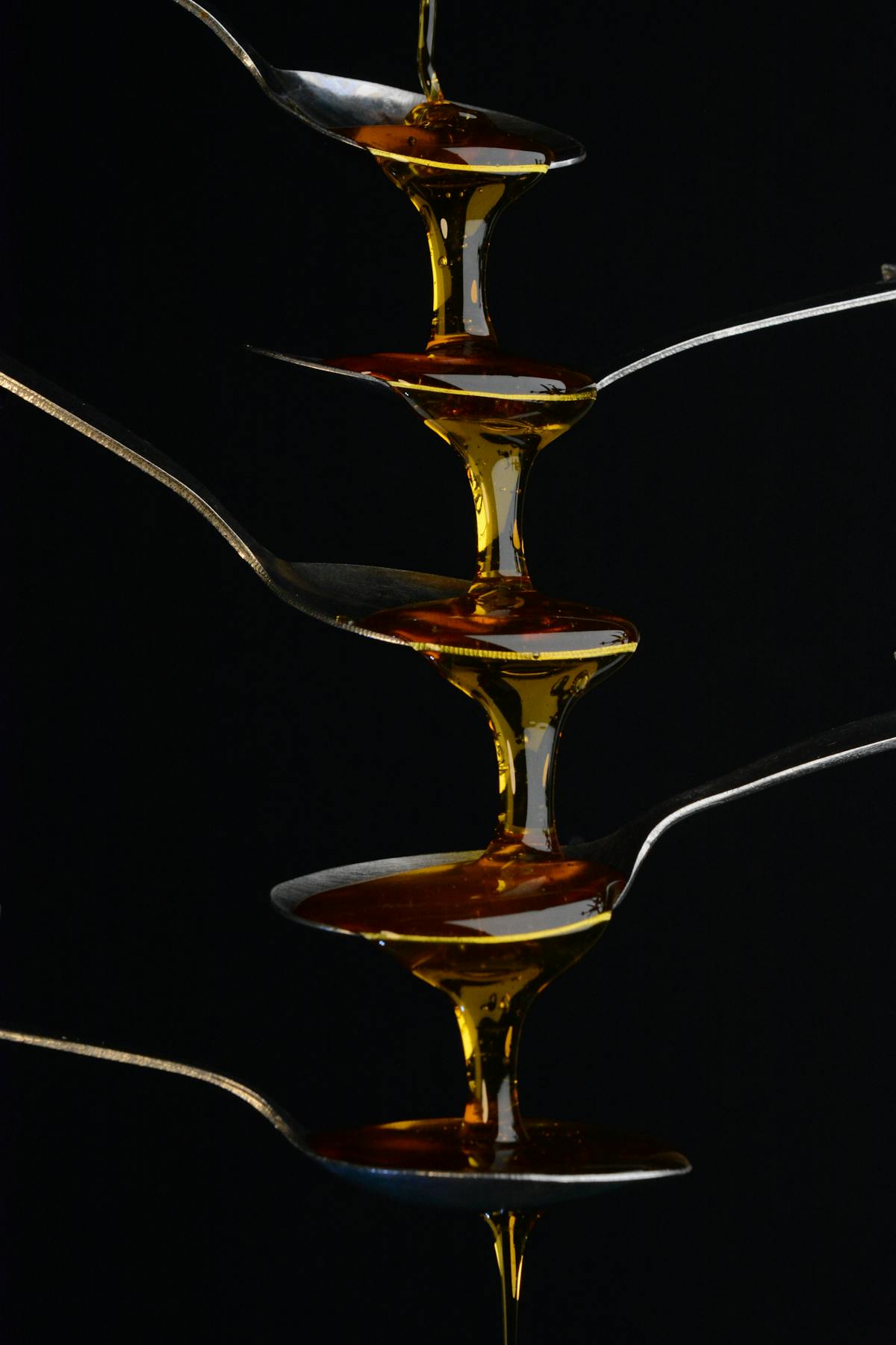 Honey On Spoon Black Background Photos, Download The BEST Free Honey On ...
