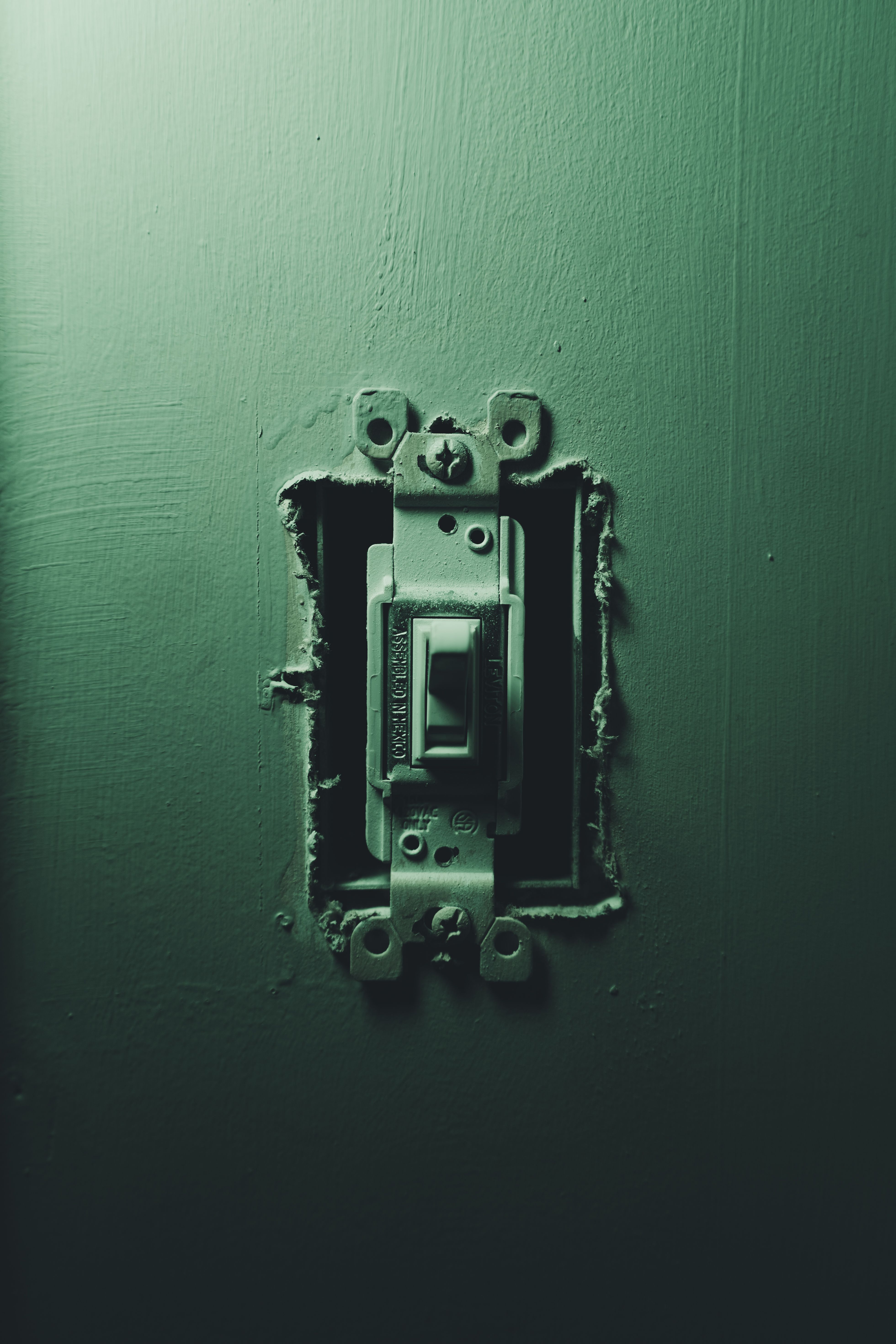 Close-up of Retro Light Switch on Wall Covered with Floral Pattern ...