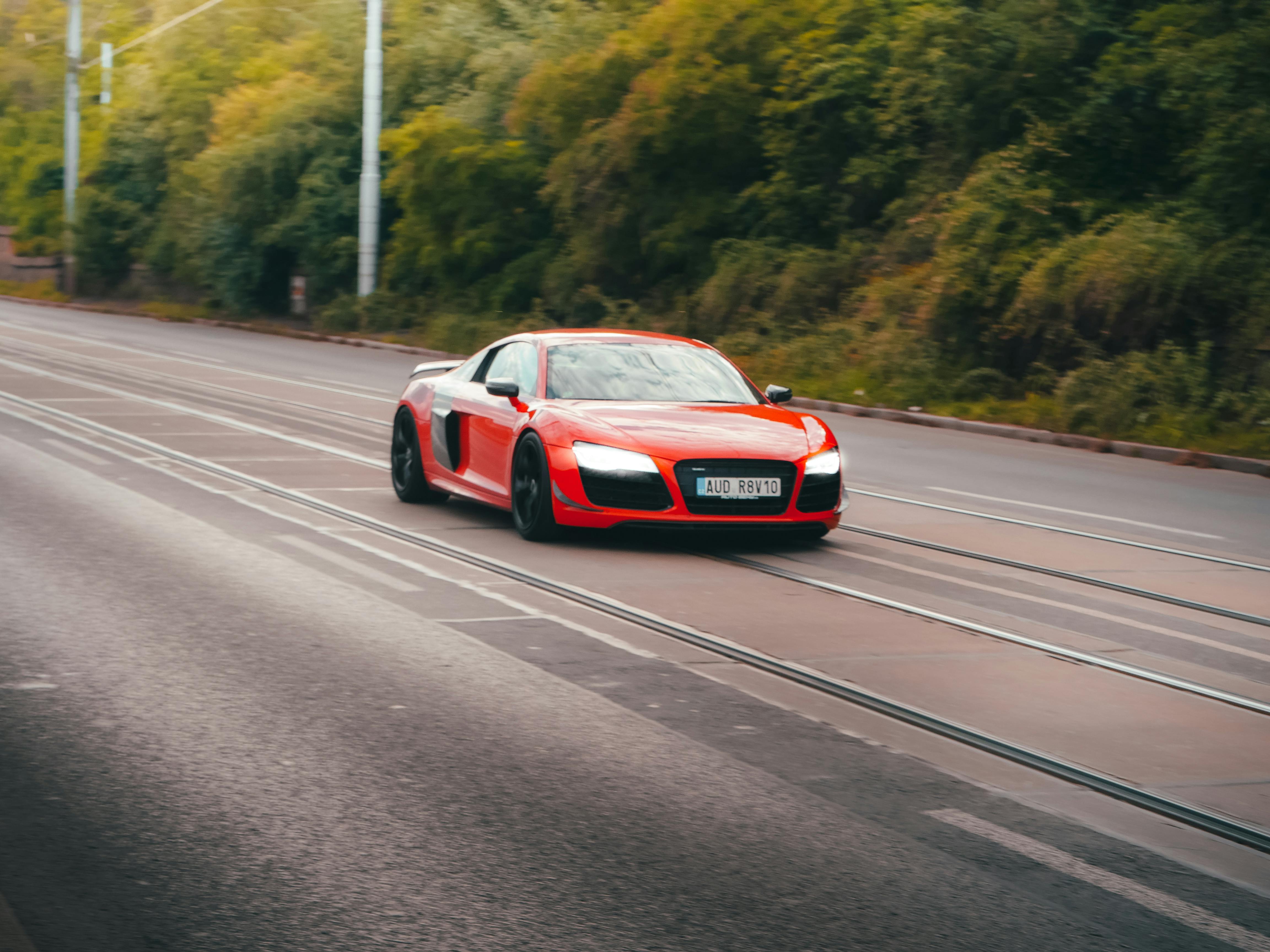 Fast Car on Road · Free Stock Photo