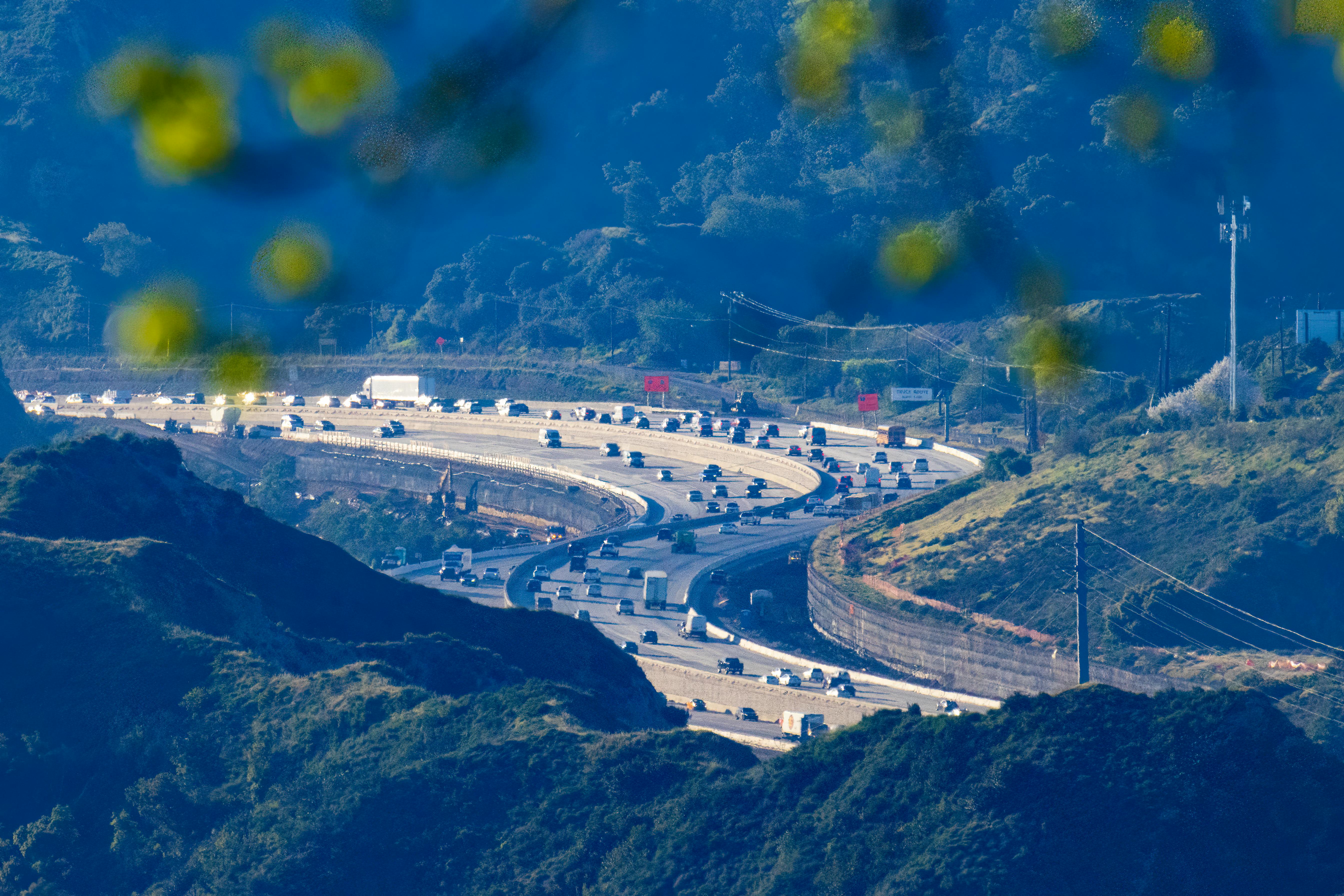 Aerial View of a Highway in Mountains · Free Stock Photo