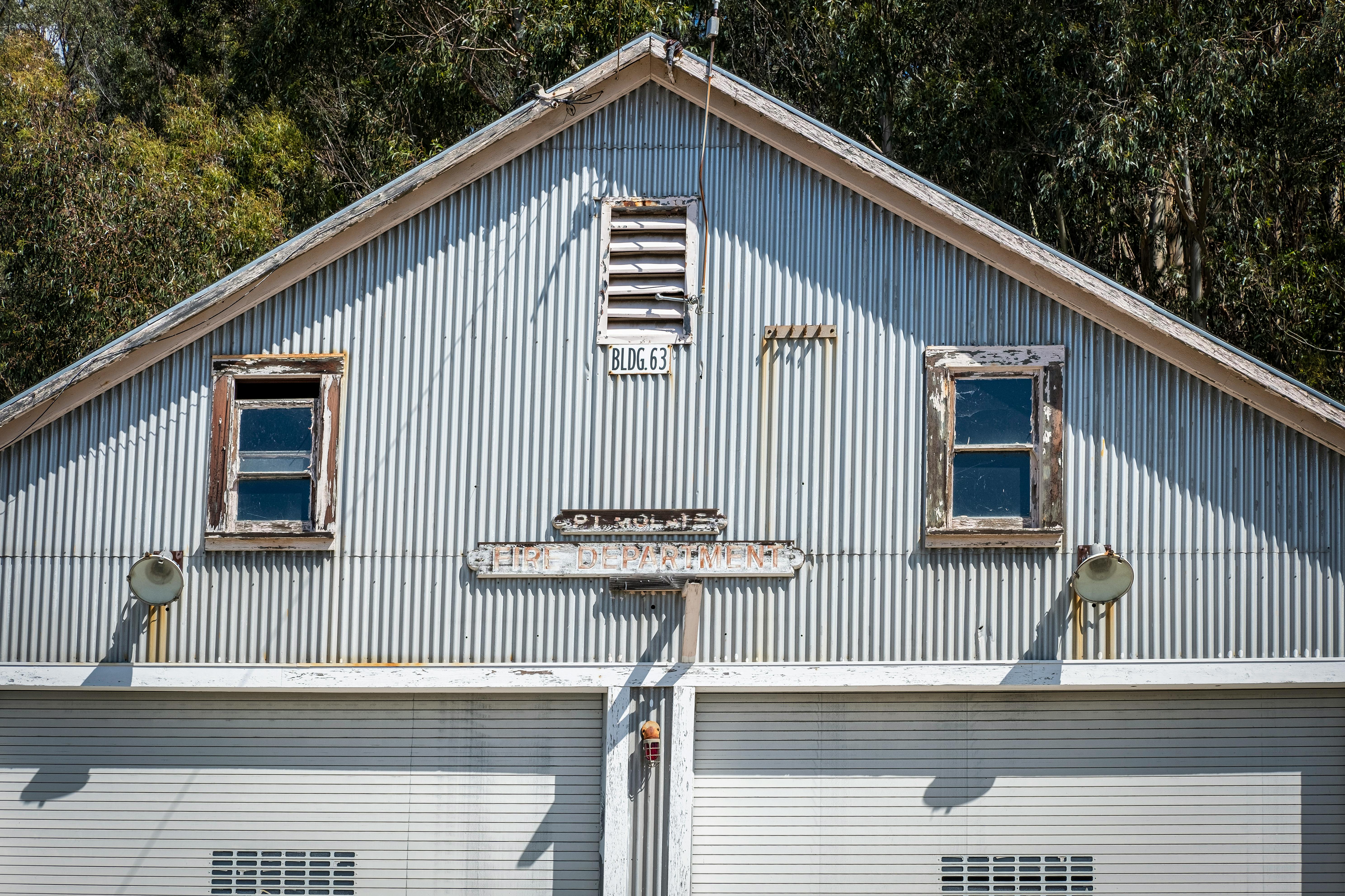 Faded Signboard on an Abandoned Fire Station Building · Free Stock Photo