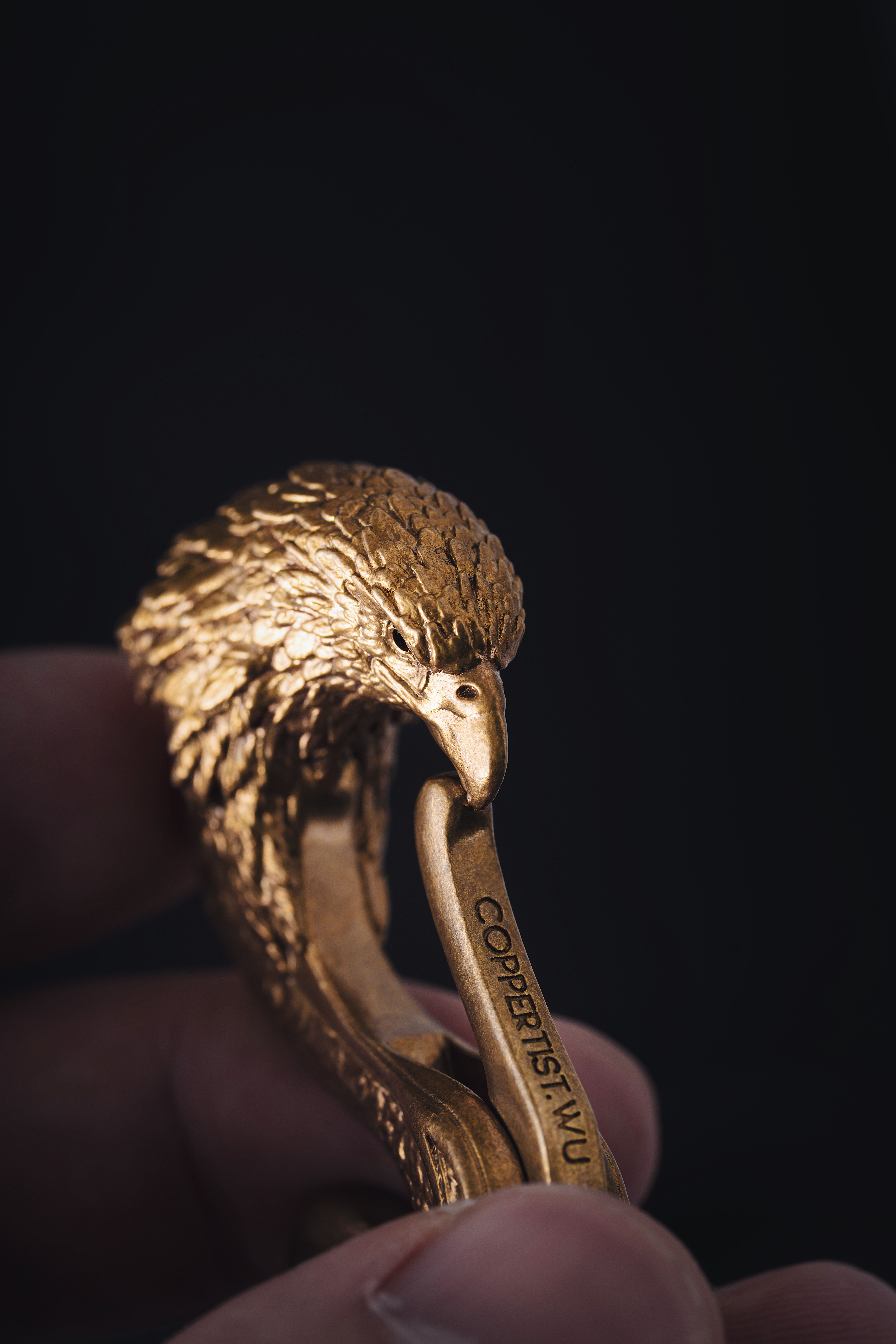 Hand Holds Eagle Keychain · Free Stock Photo