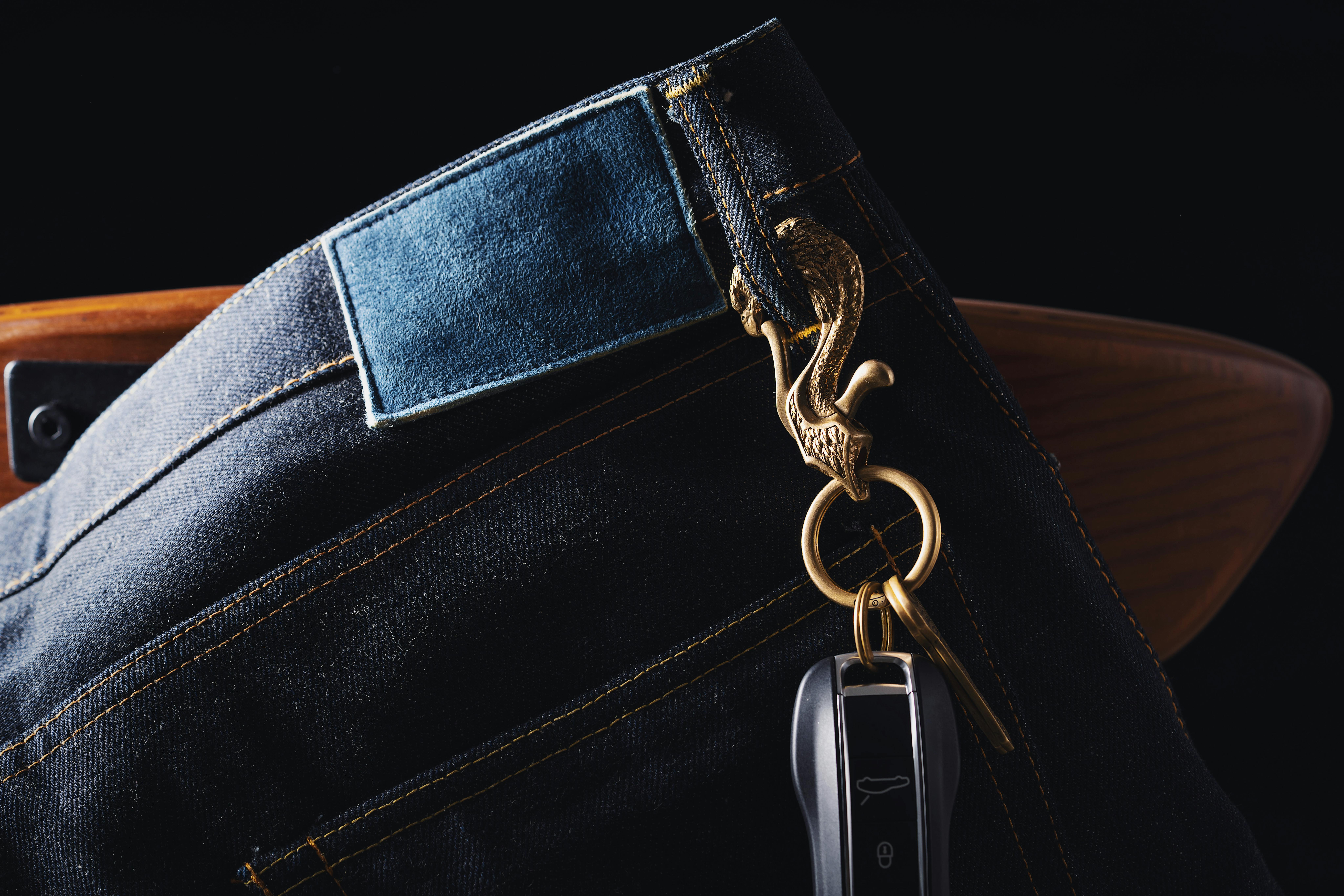 Golden Keychain on Jeans · Free Stock Photo