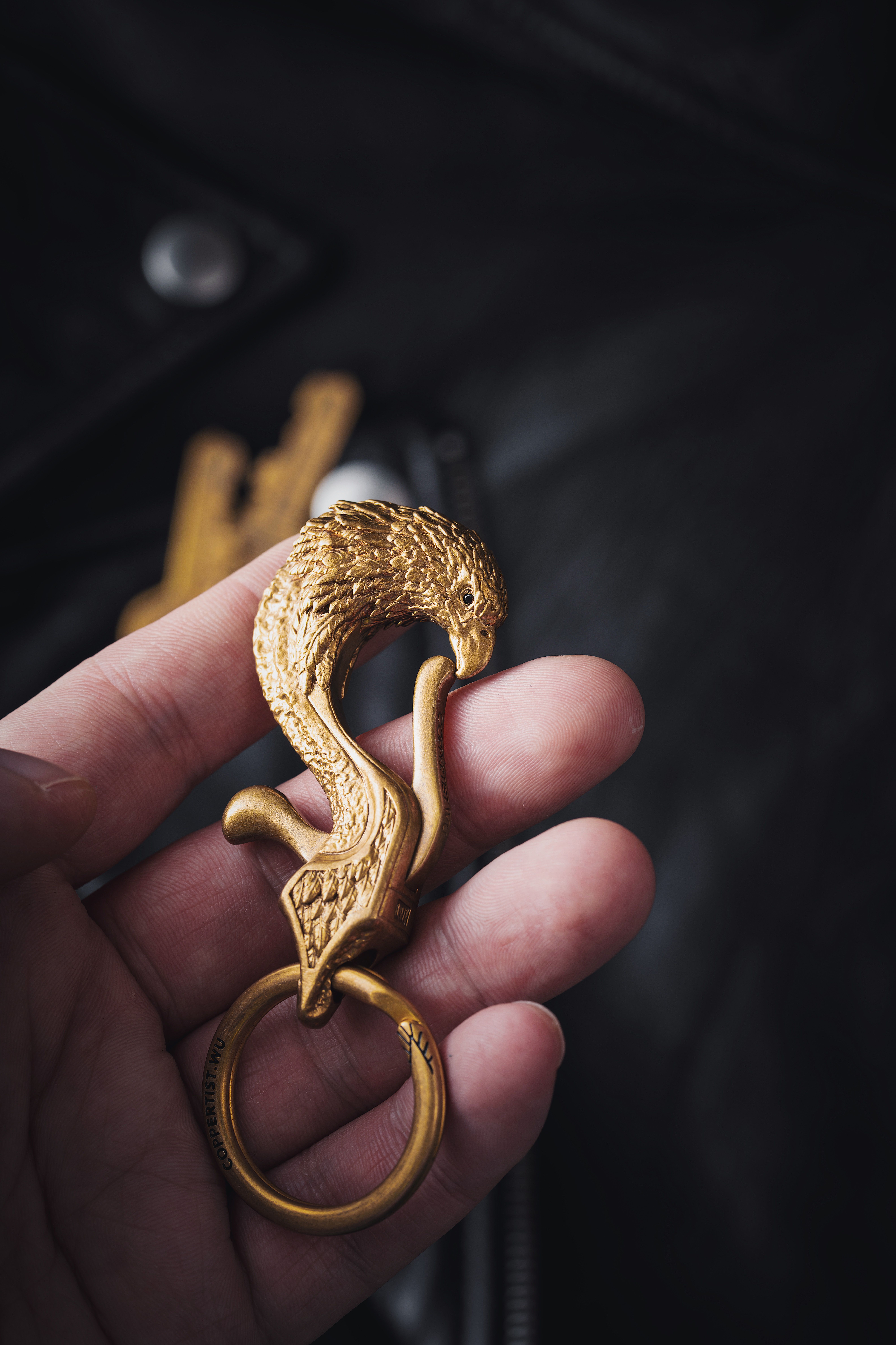 Eagle Keyring in hand · Free Stock Photo