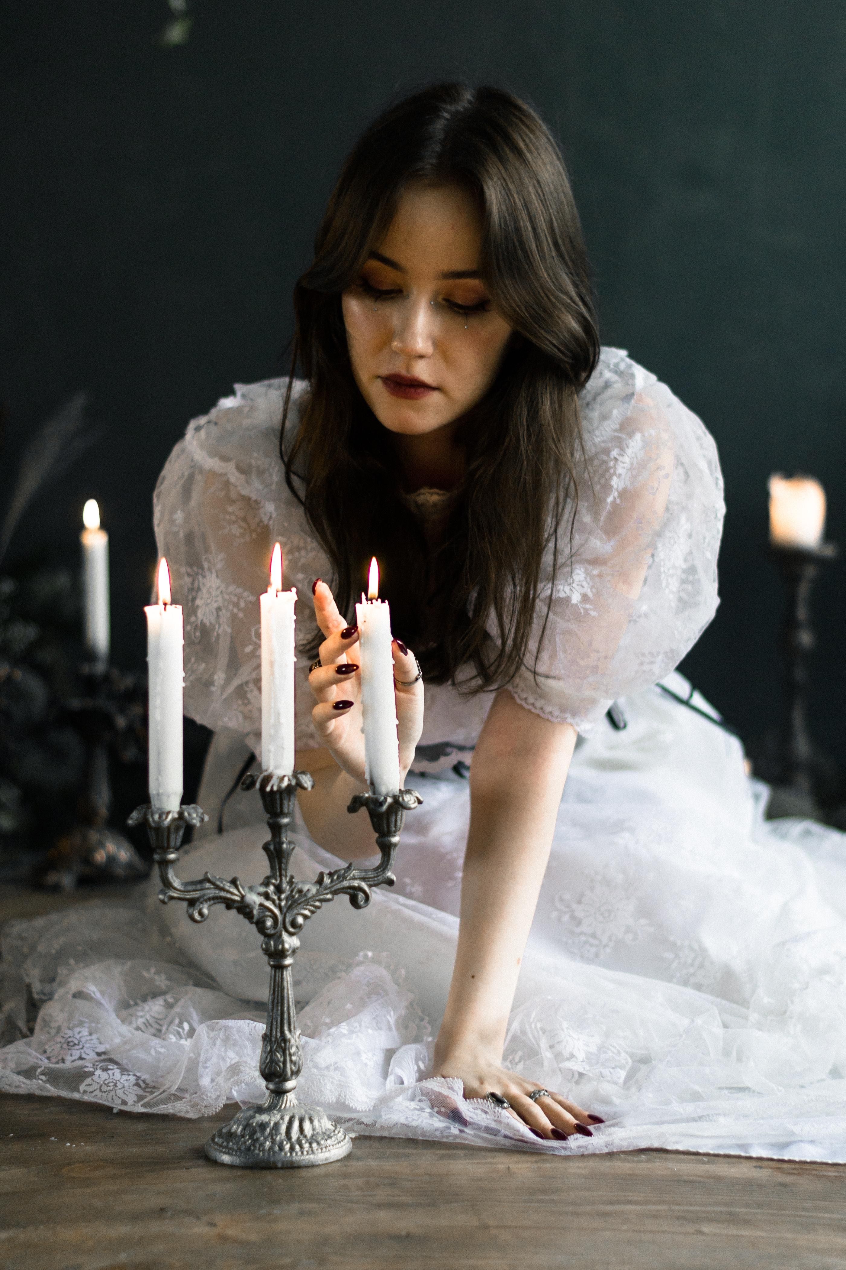 Bride with Wax Candles in Candlestick · Free Stock Photo