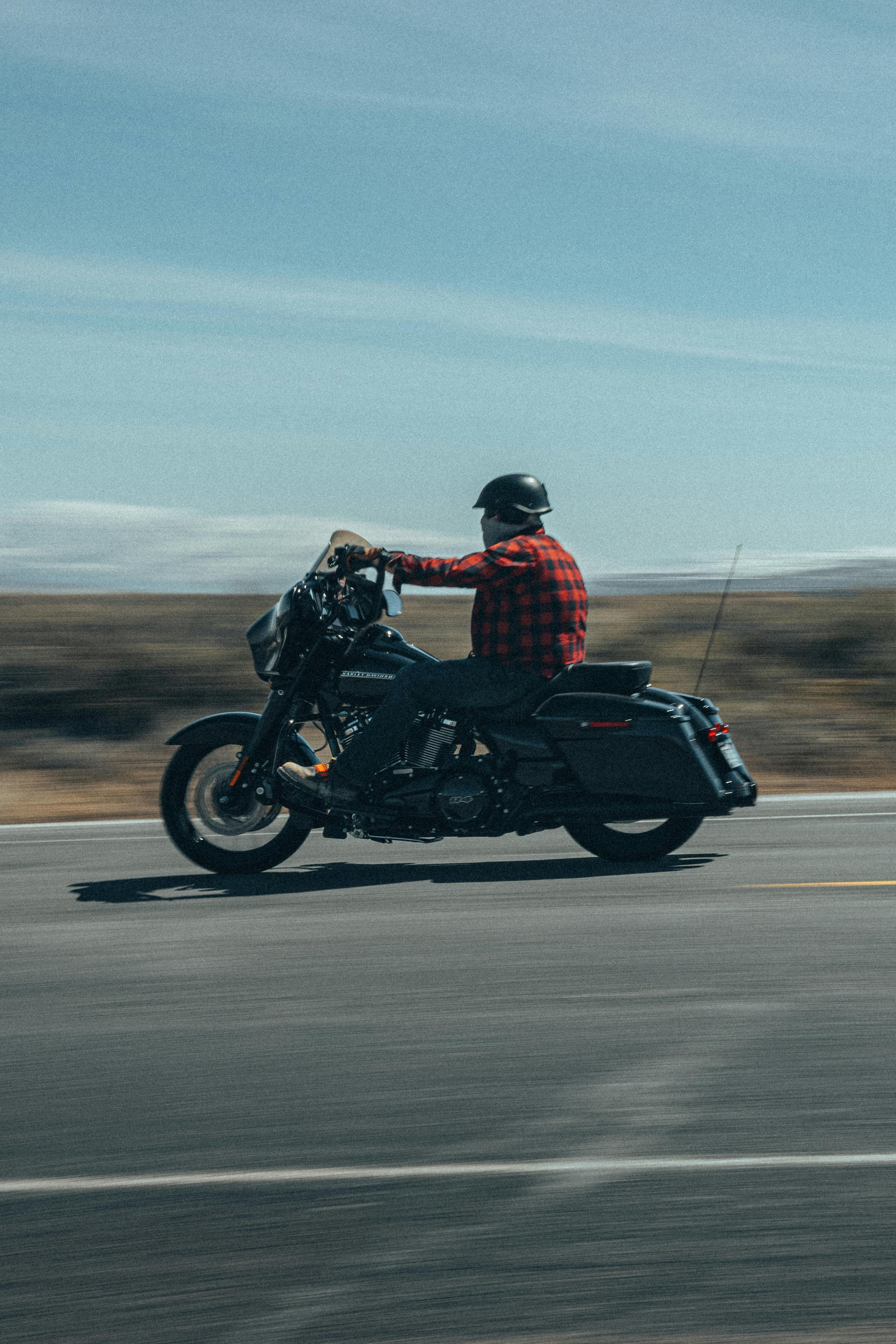 Man Riding Motorcycle on Road · Free Stock Photo