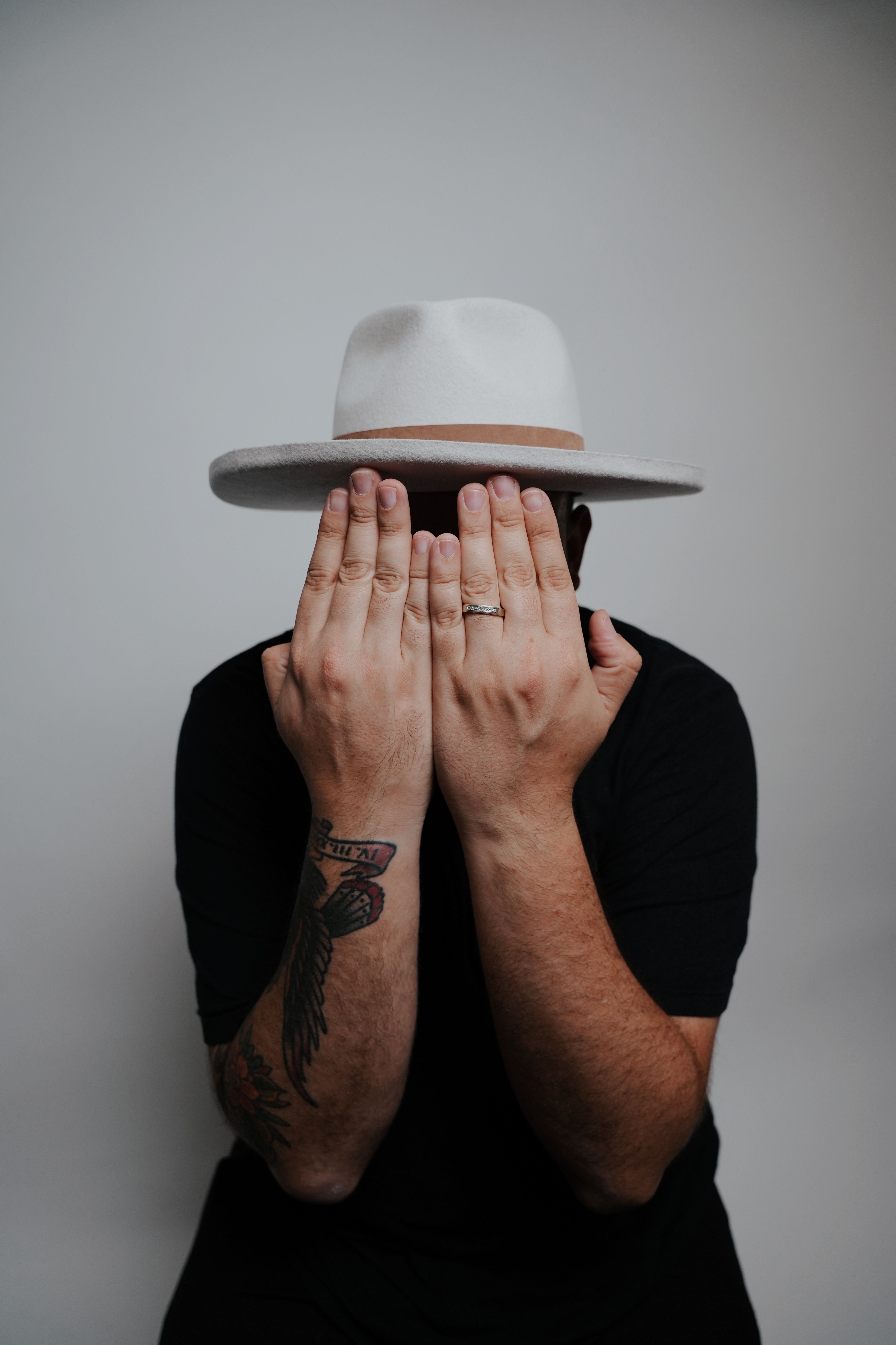 Man Face behind his Hands · Free Stock Photo