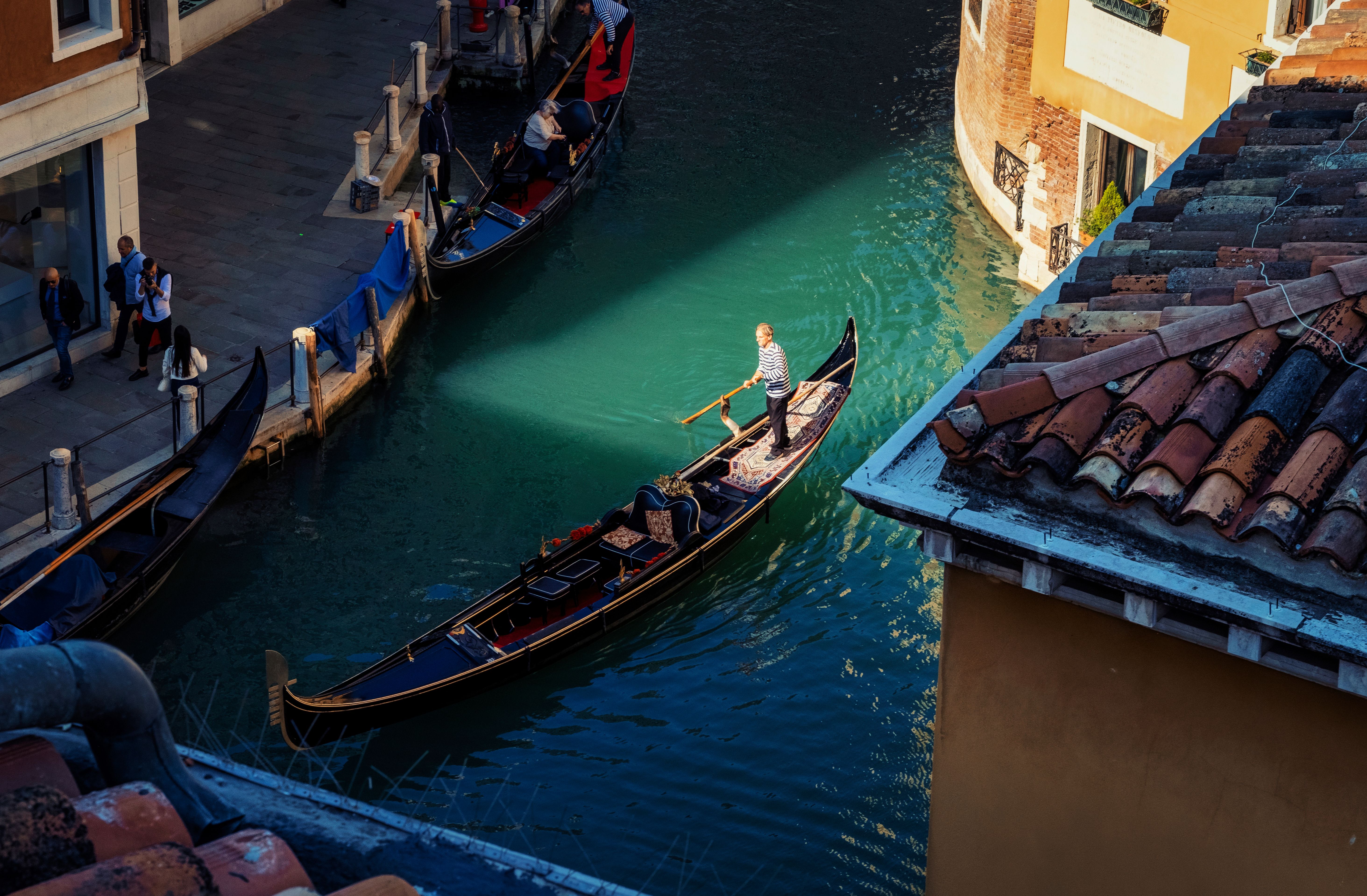 Gondolier Rowing Gondola Boat in Canal Venice Italy · Free Stock Photo