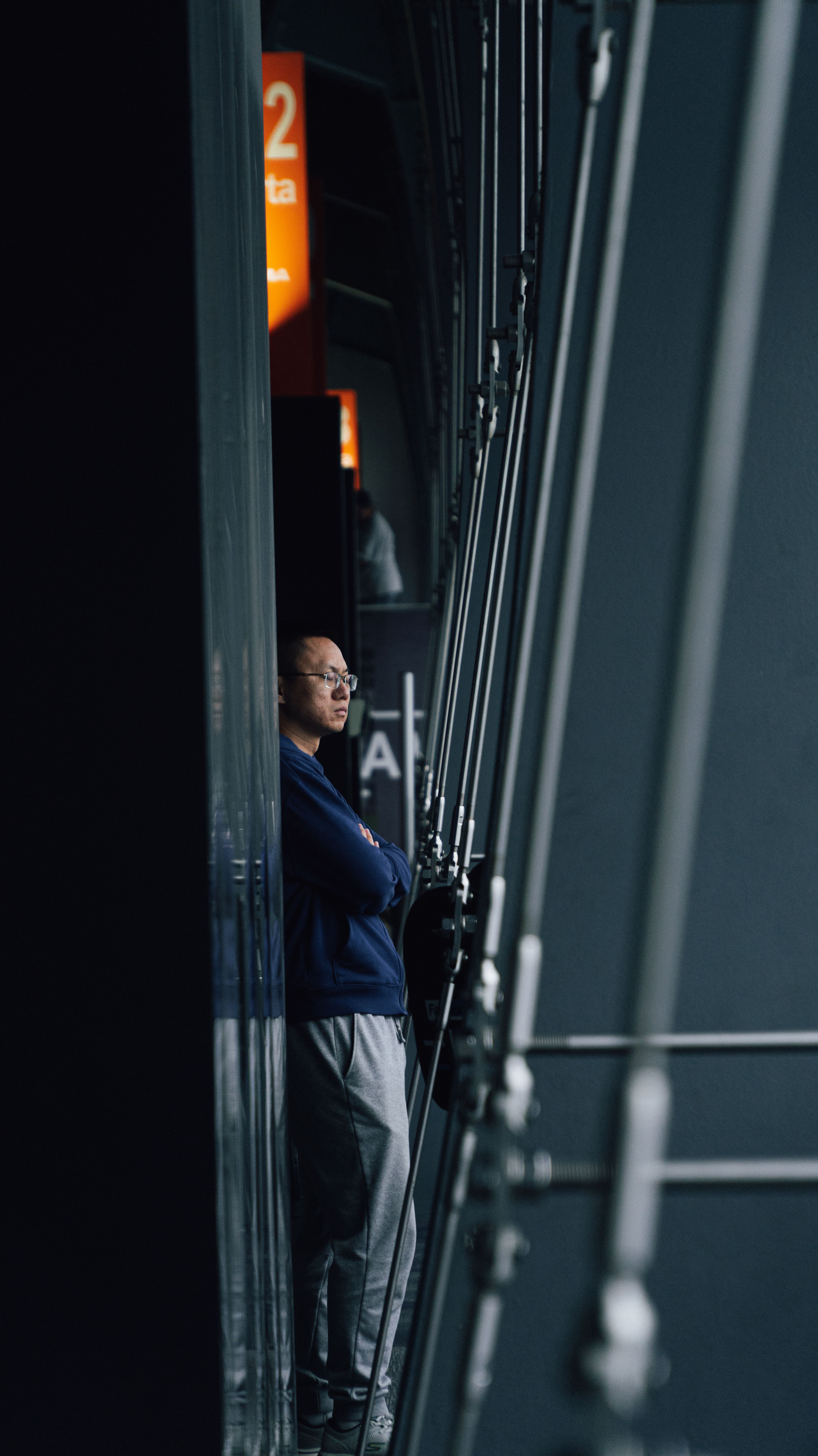 Man Standing near Wall · Free Stock Photo