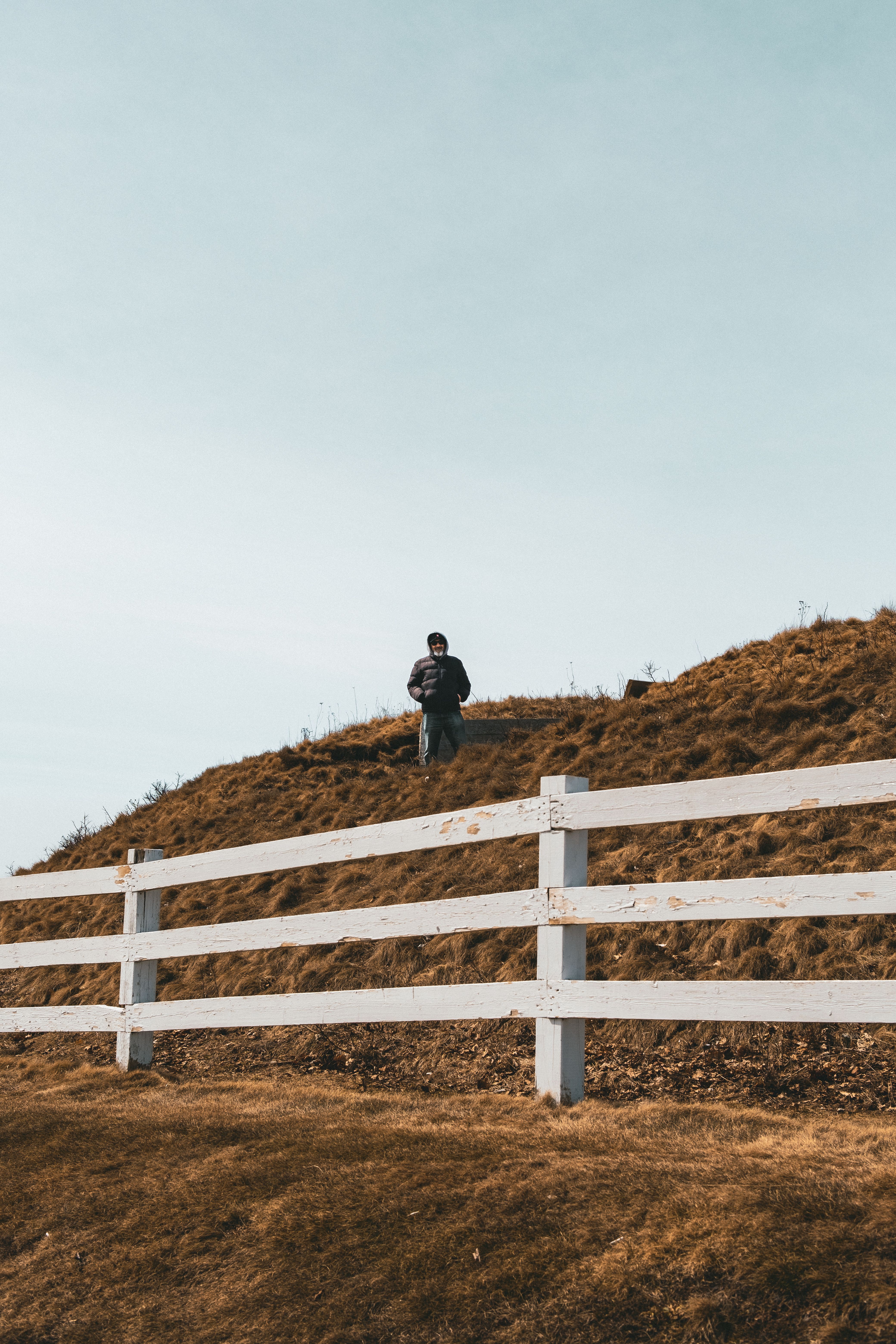 Man Standing on a Hill · Free Stock Photo