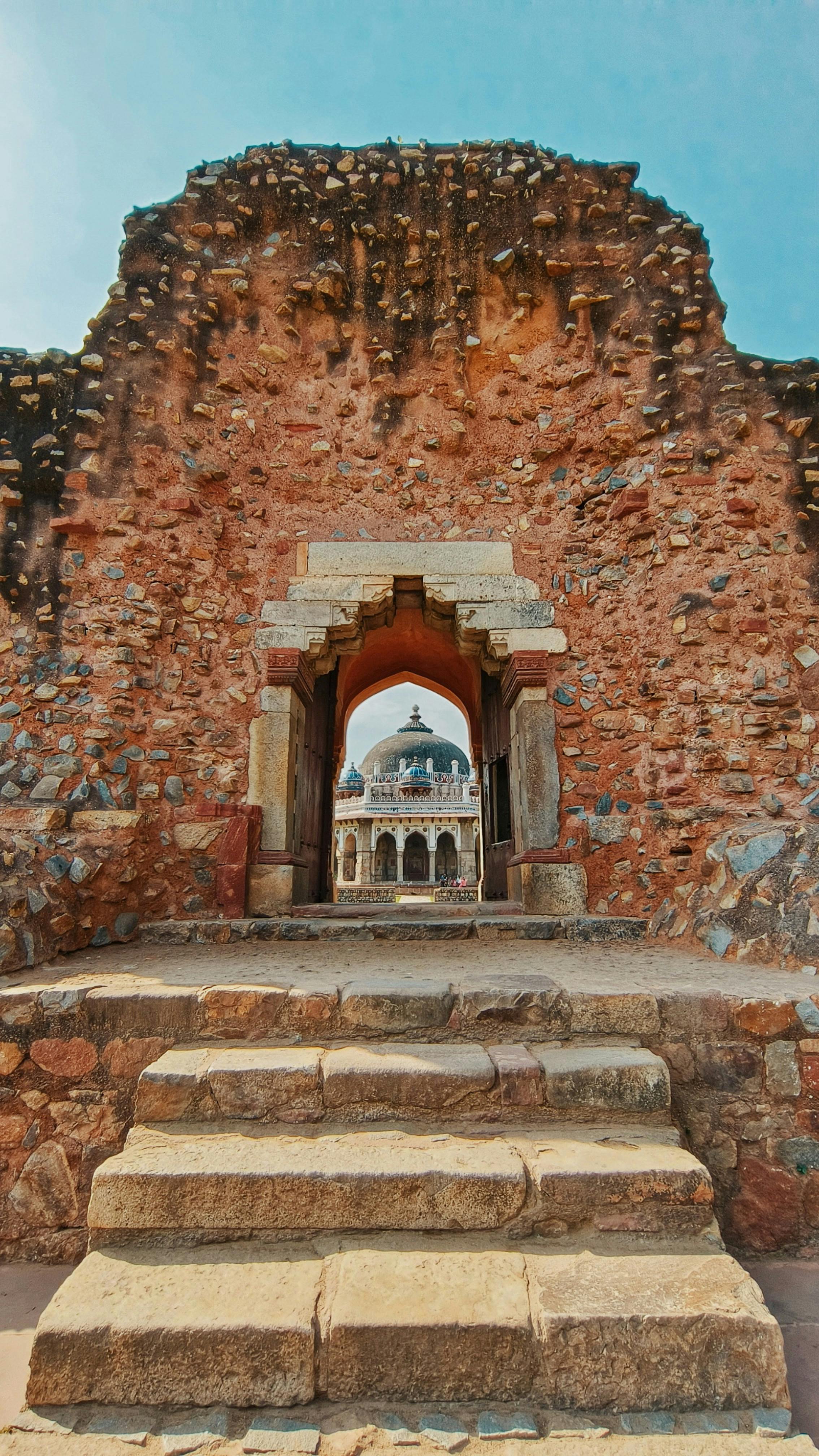 Mosque Seen through Stone Gate · Free Stock Photo