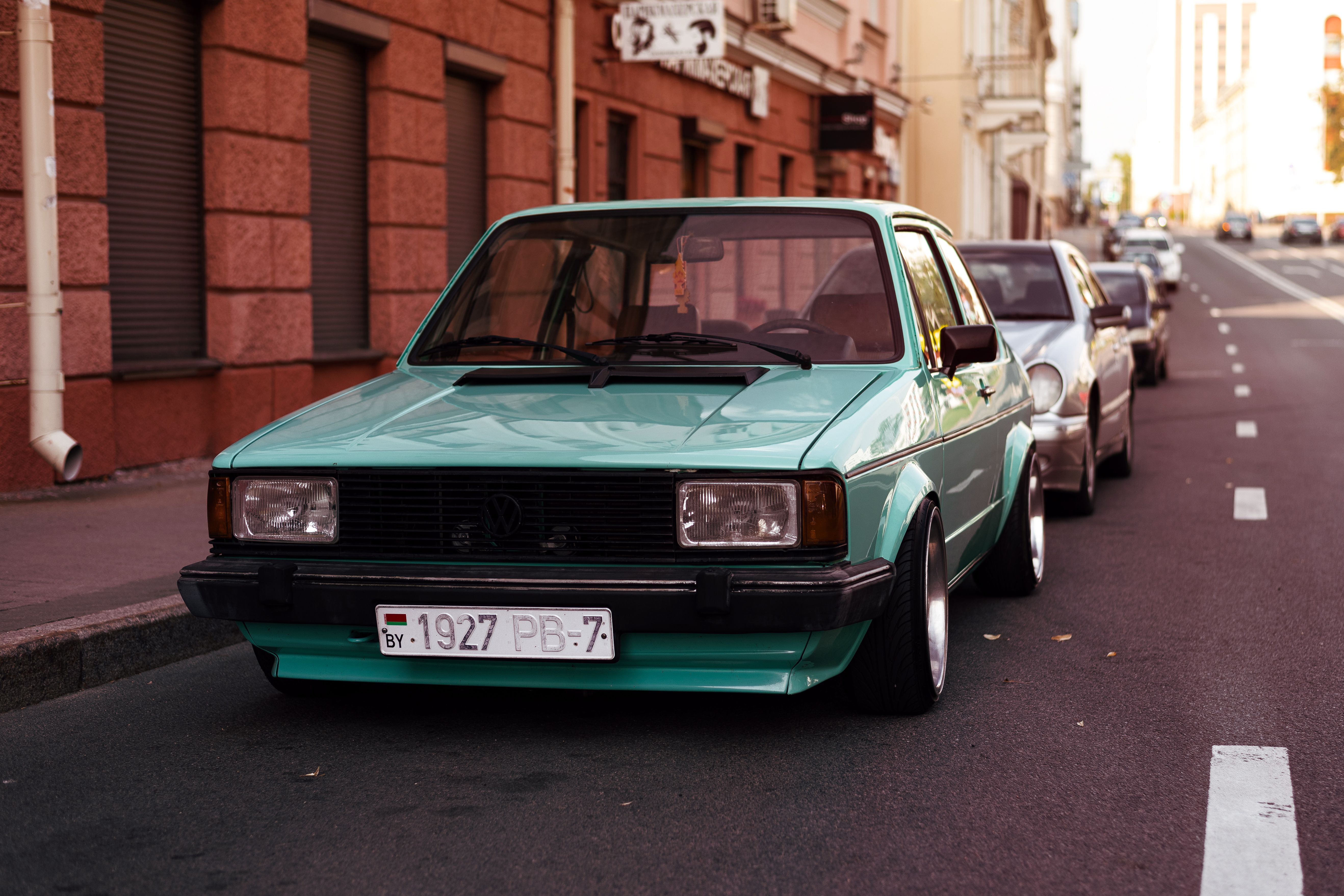 Retro Car on City Road · Free Stock Photo