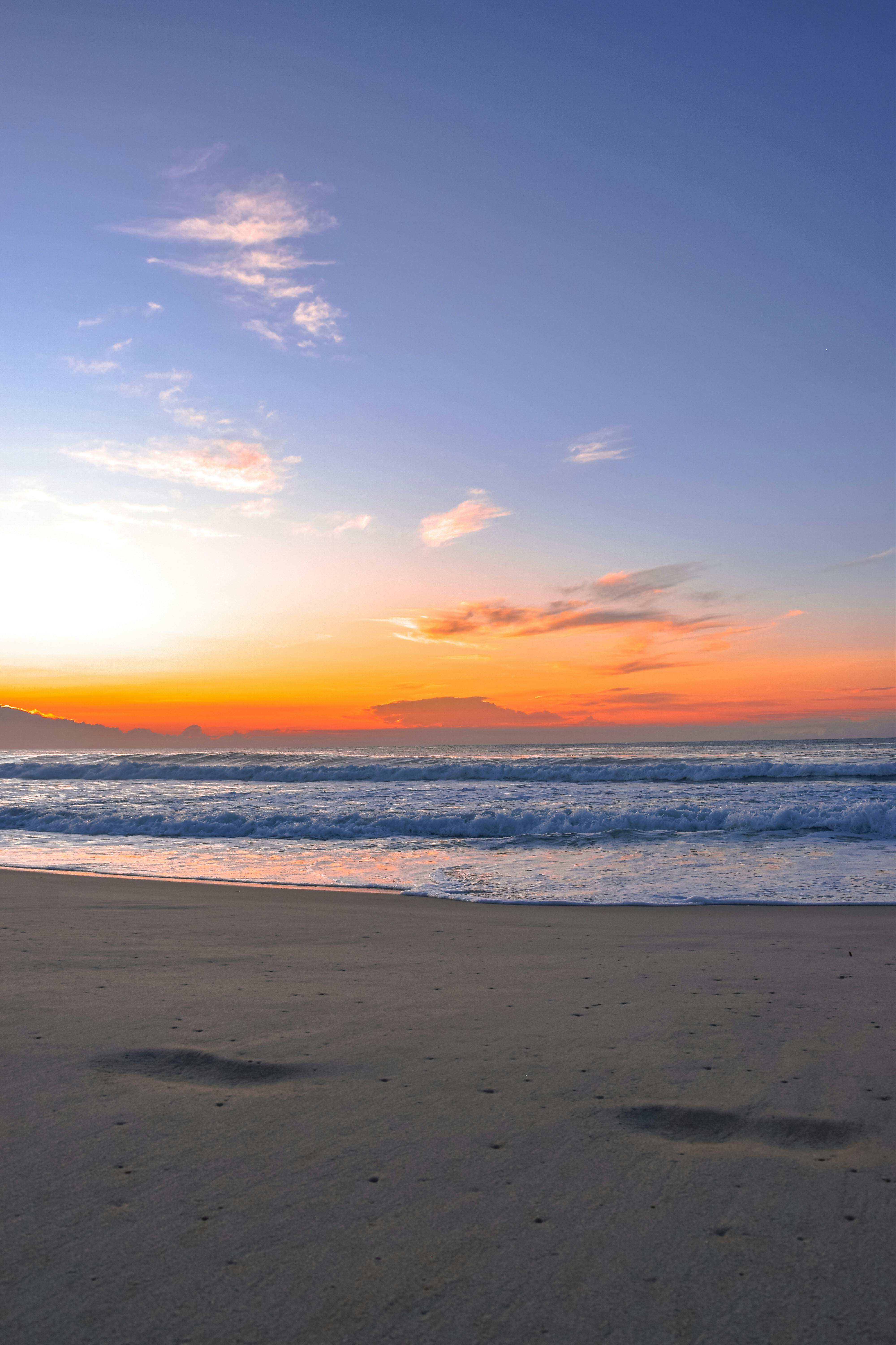 Beach During Sunset · Free Stock Photo
