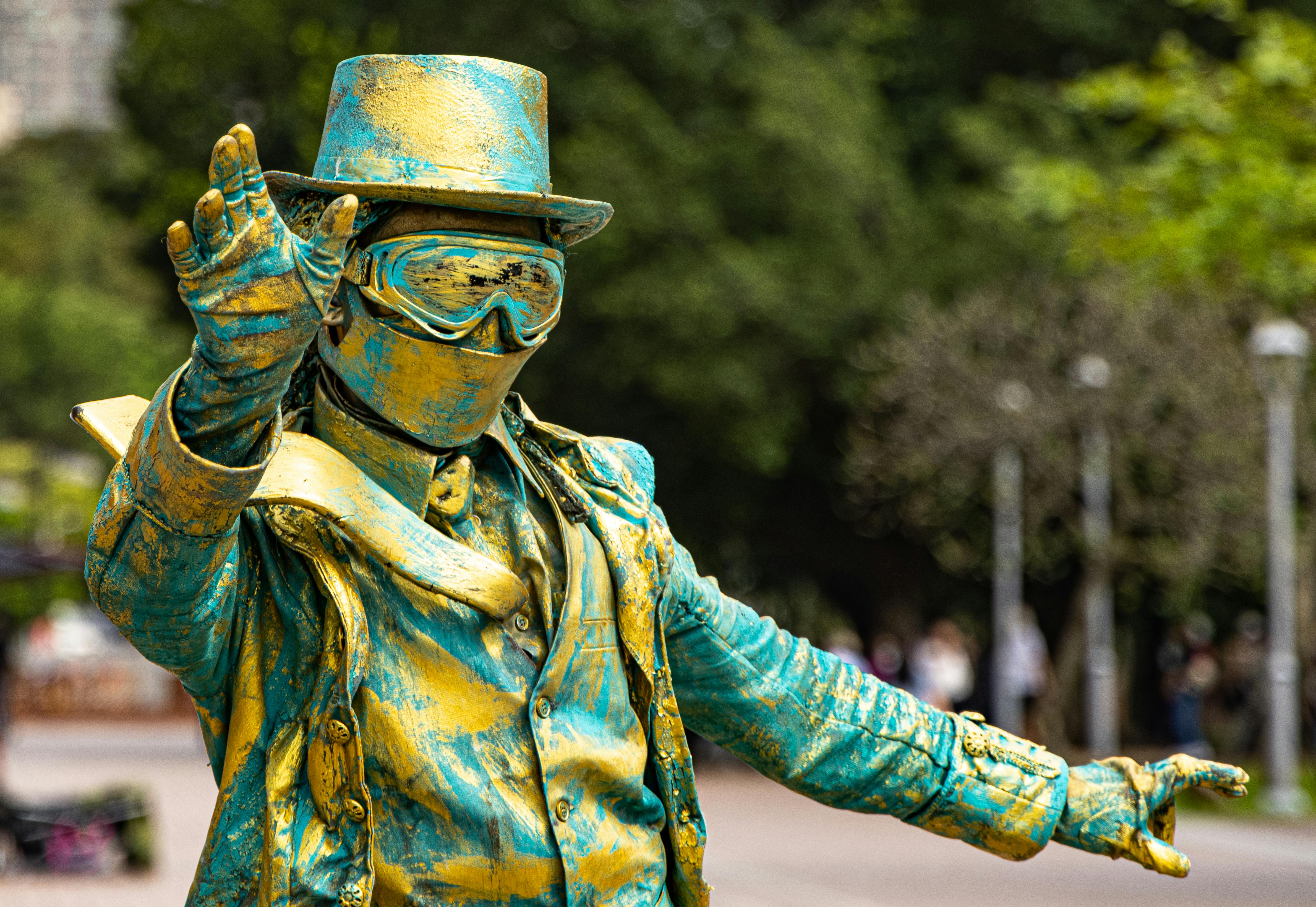 Man in Statue Costume Posing on Street · Free Stock Photo