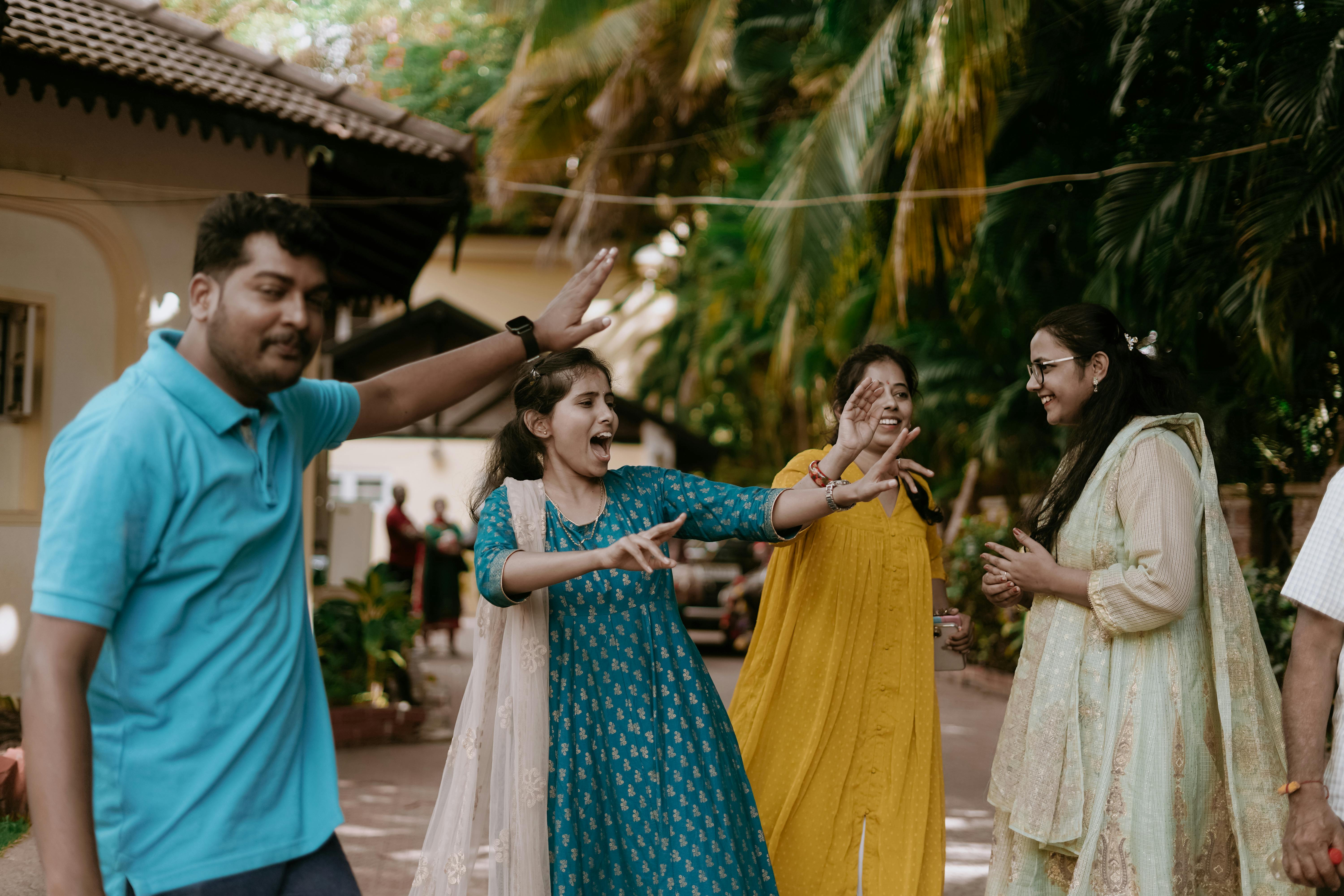 People Sharing Traditional Sweets · Free Stock Photo