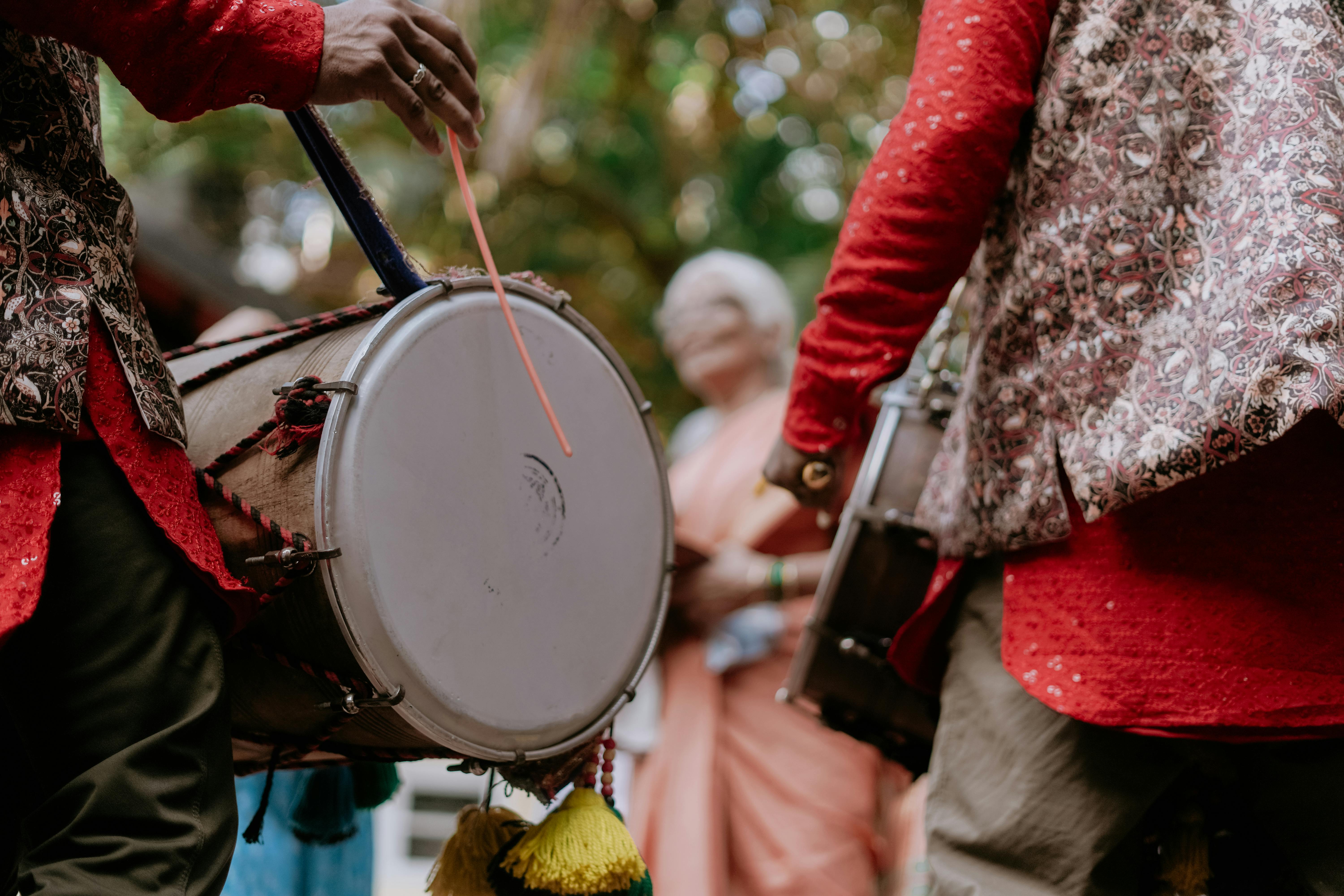 Man Playing on a Traditional Drum · Free Stock Photo