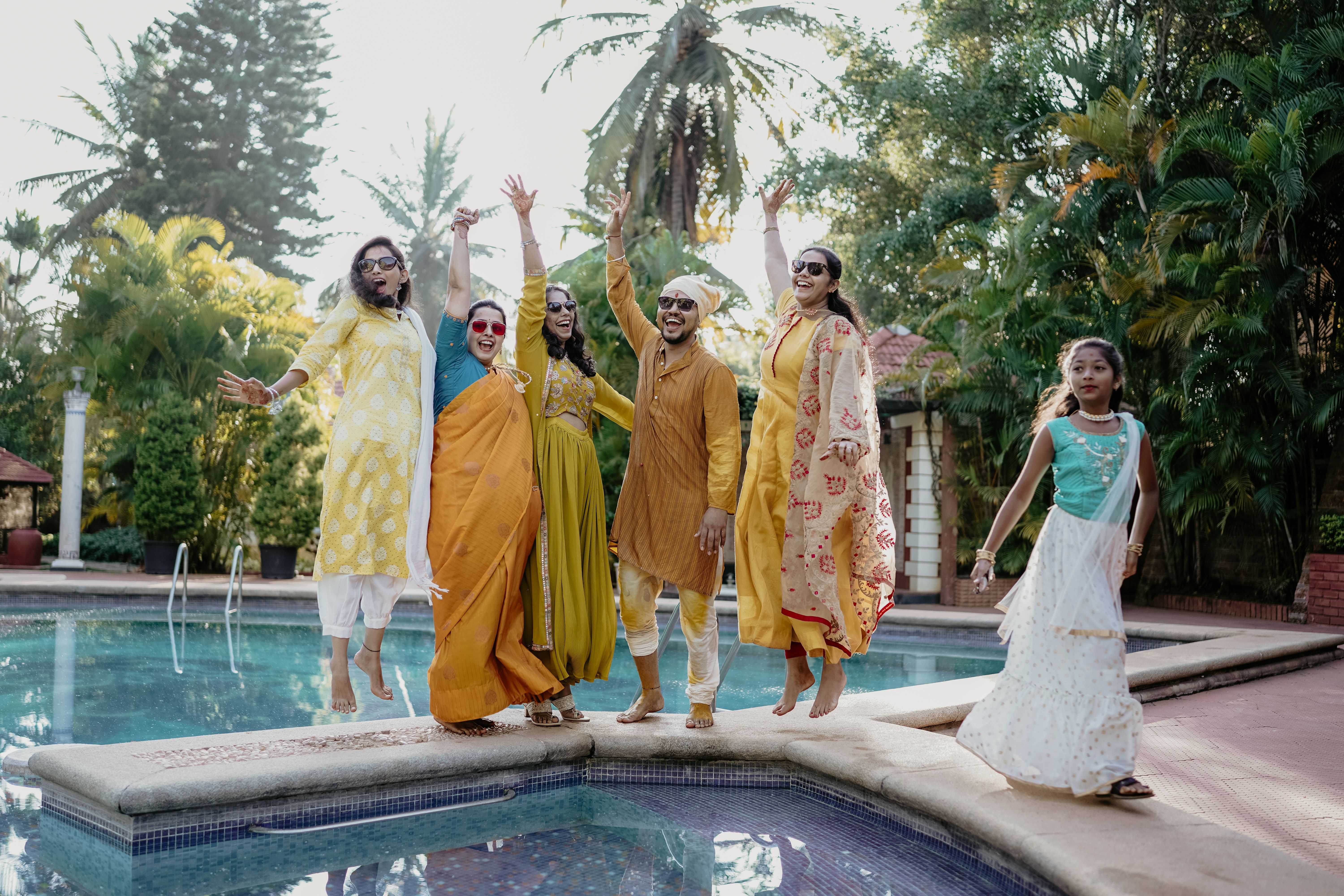 Happy People by the Pool · Free Stock Photo