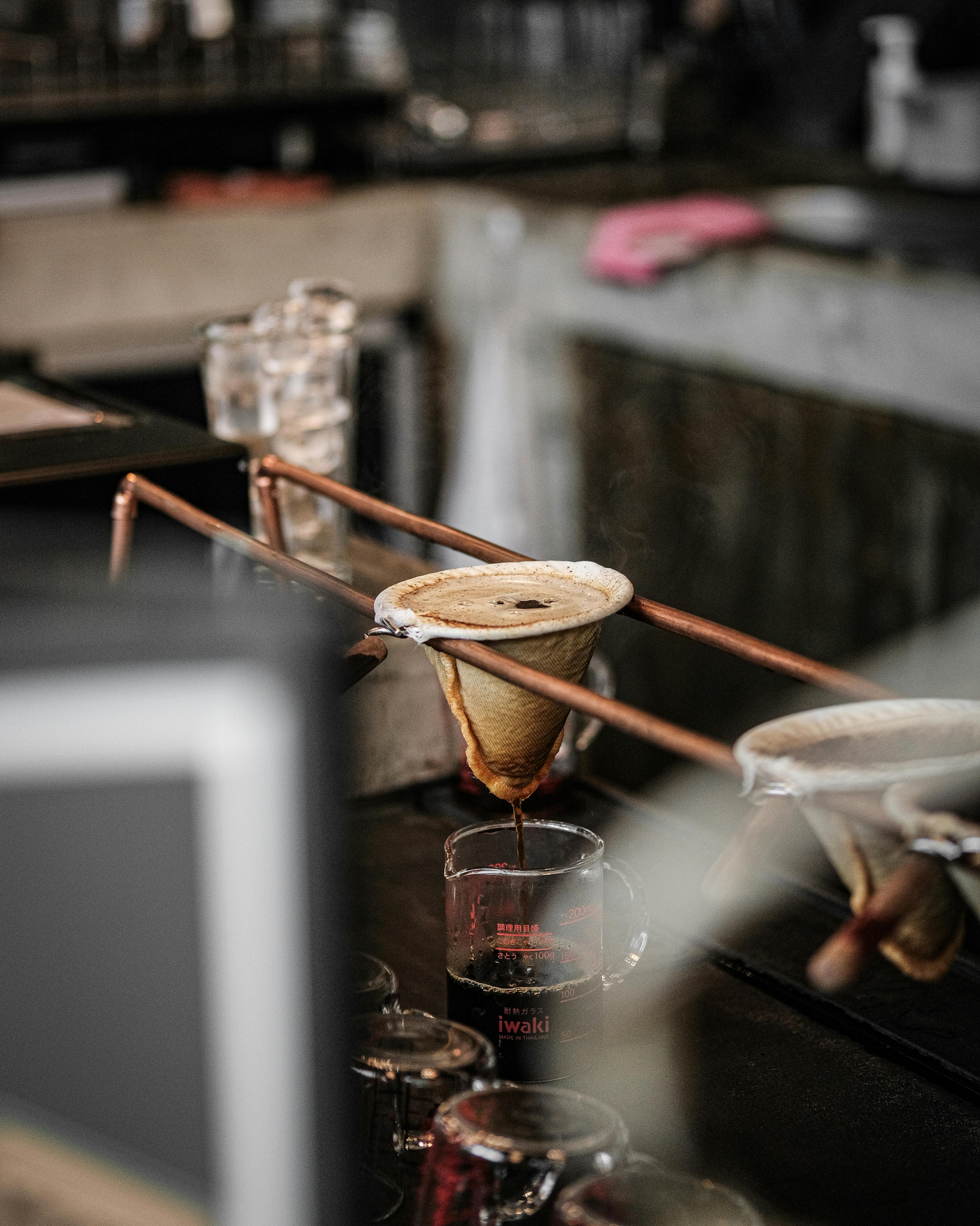 Filtering Coffee in Cafe · Free Stock Photo