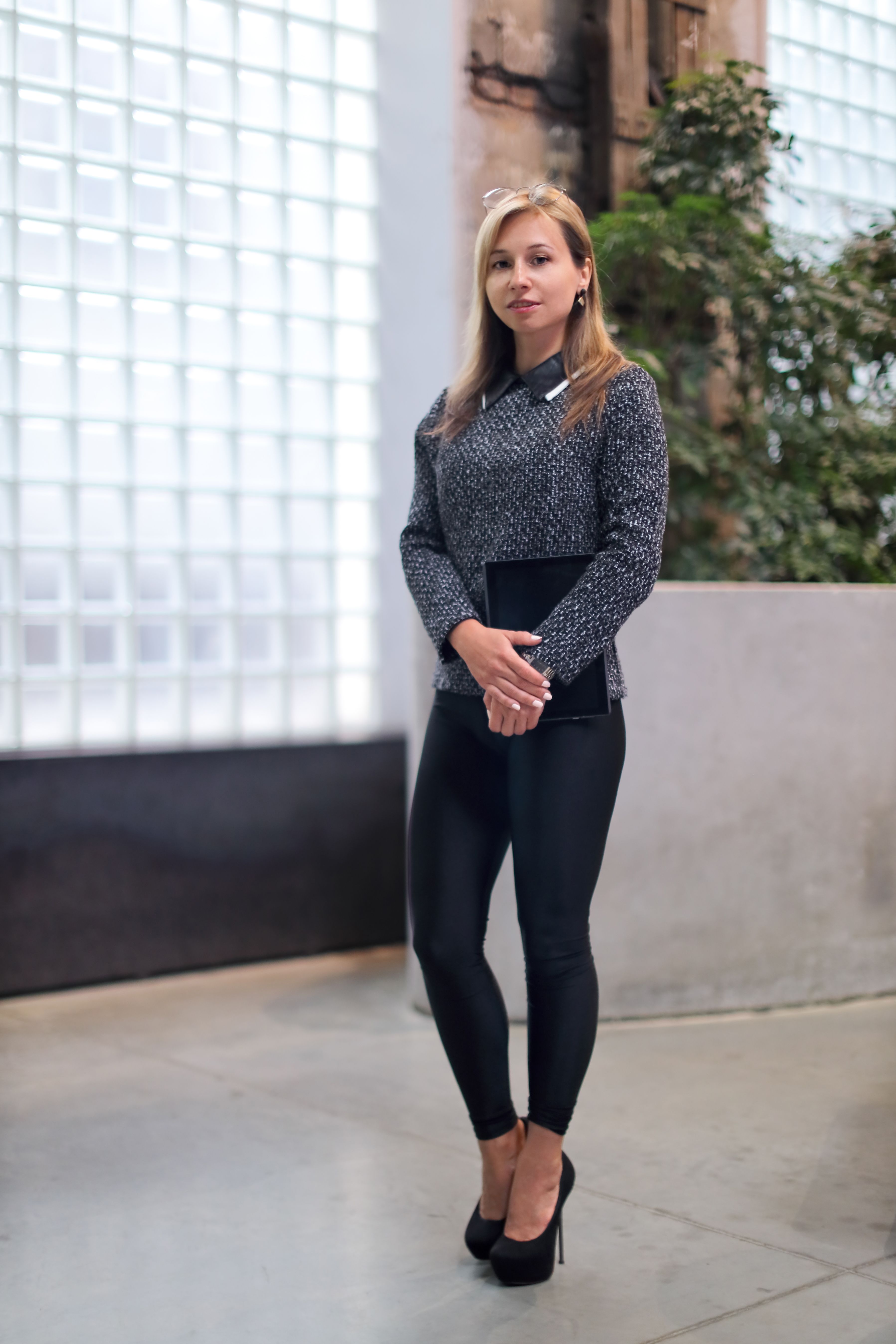 Woman Posing in Gray Clothes · Free Stock Photo