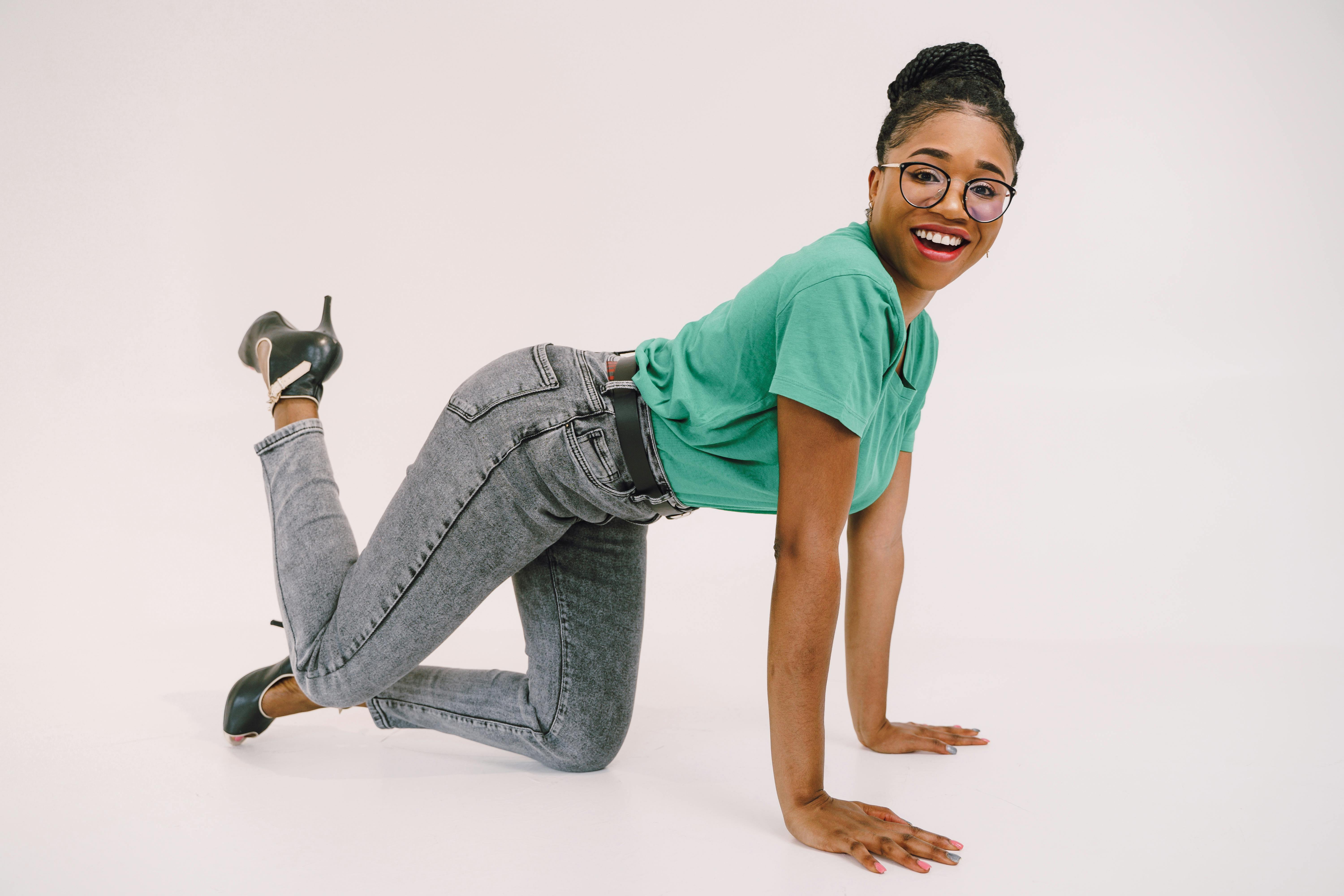 Woman in Sunglasses Crouching and Posing · Free Stock Photo