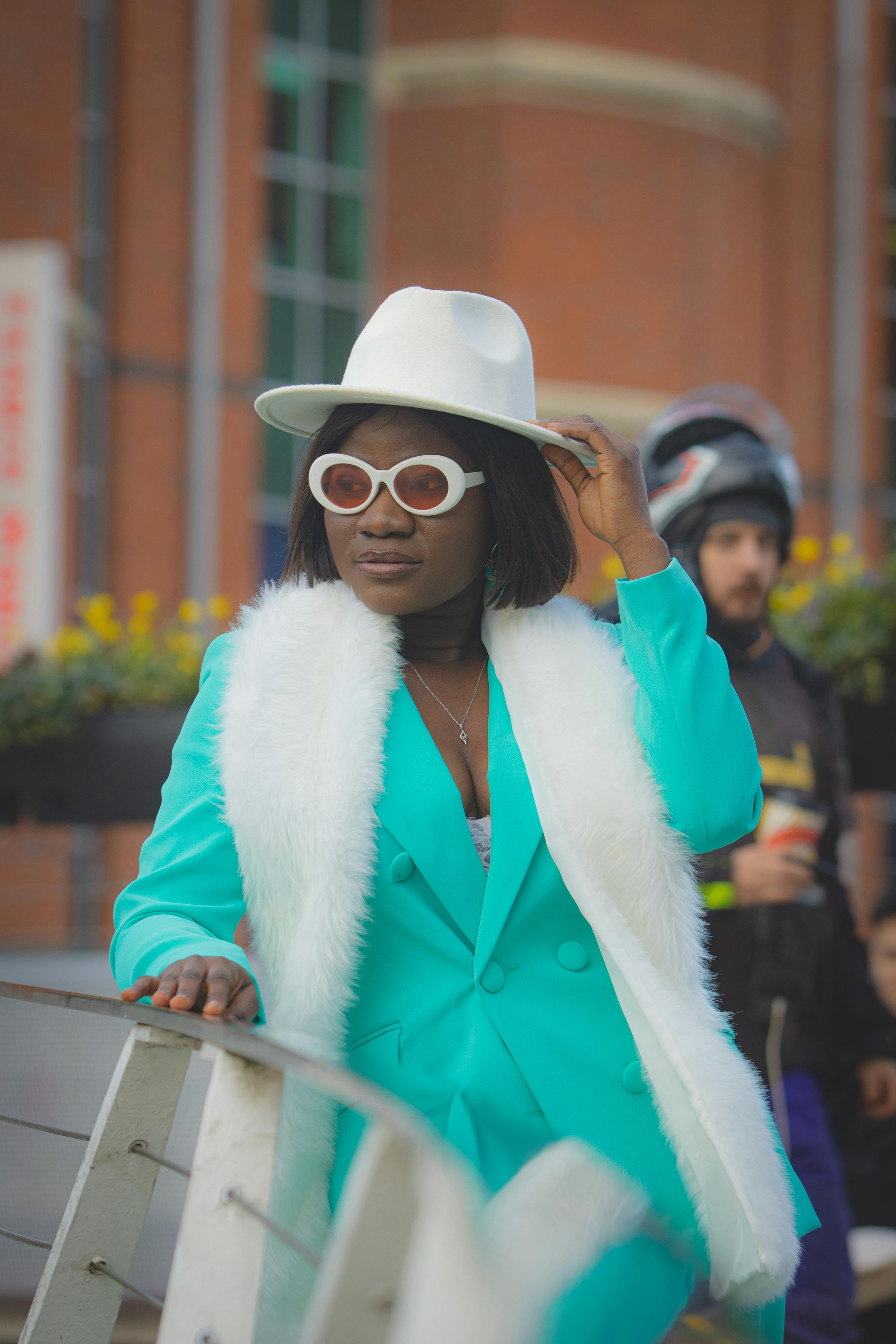 Men in Suits with Crowns Posing with Woman · Free Stock Photo