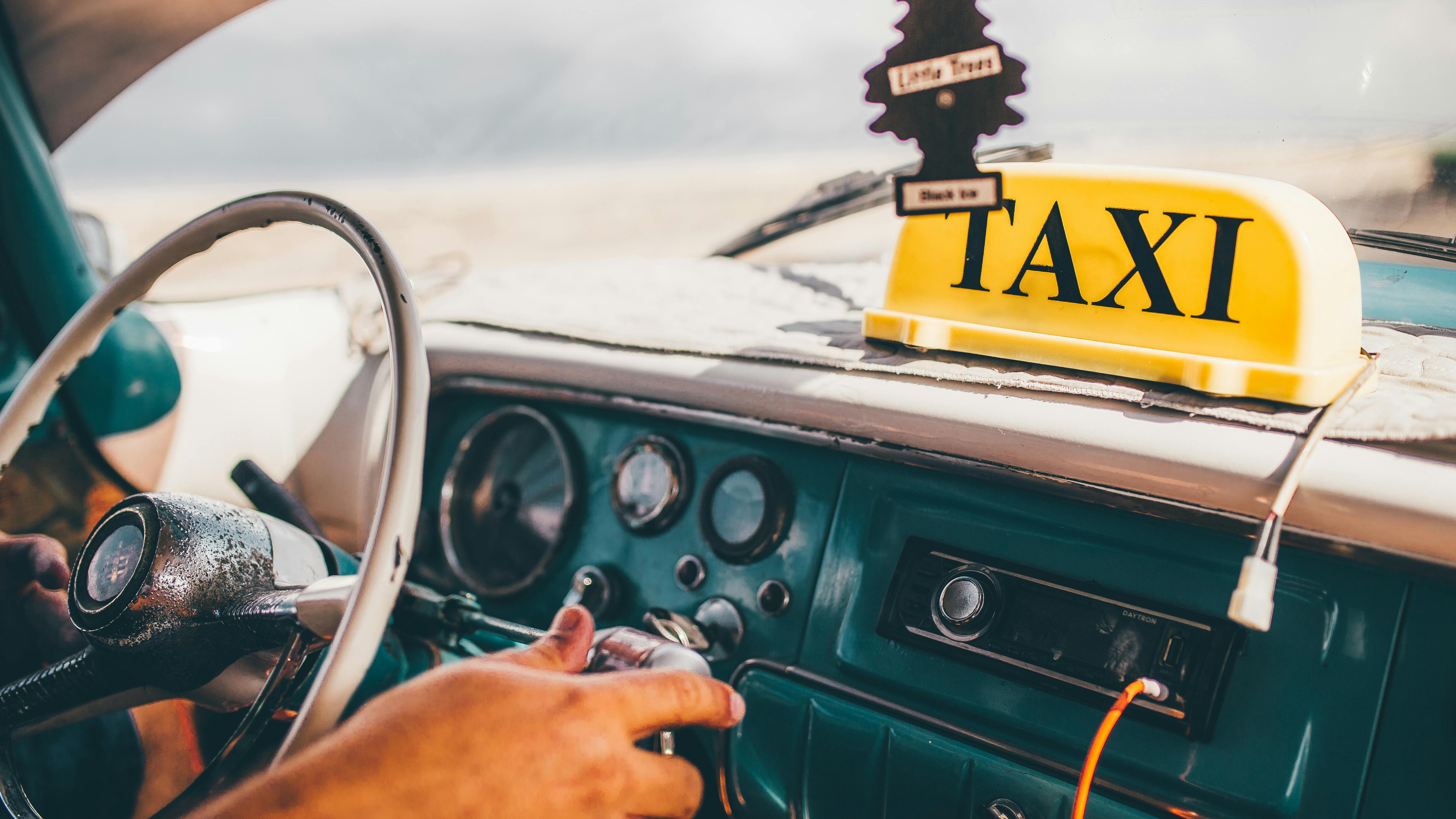 Person Driving Taxi · Free Stock Photo