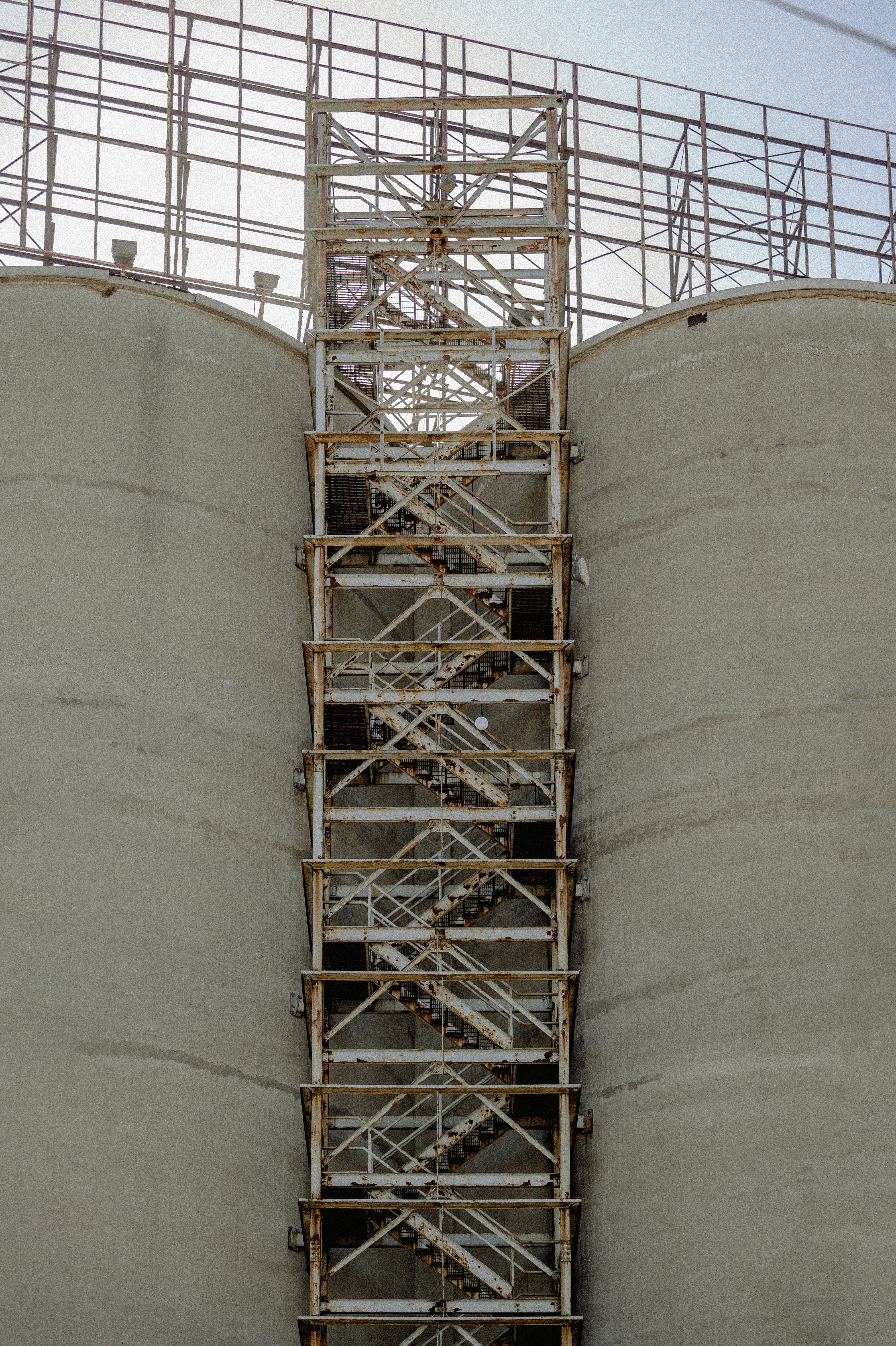Staircase between Silos · Free Stock Photo