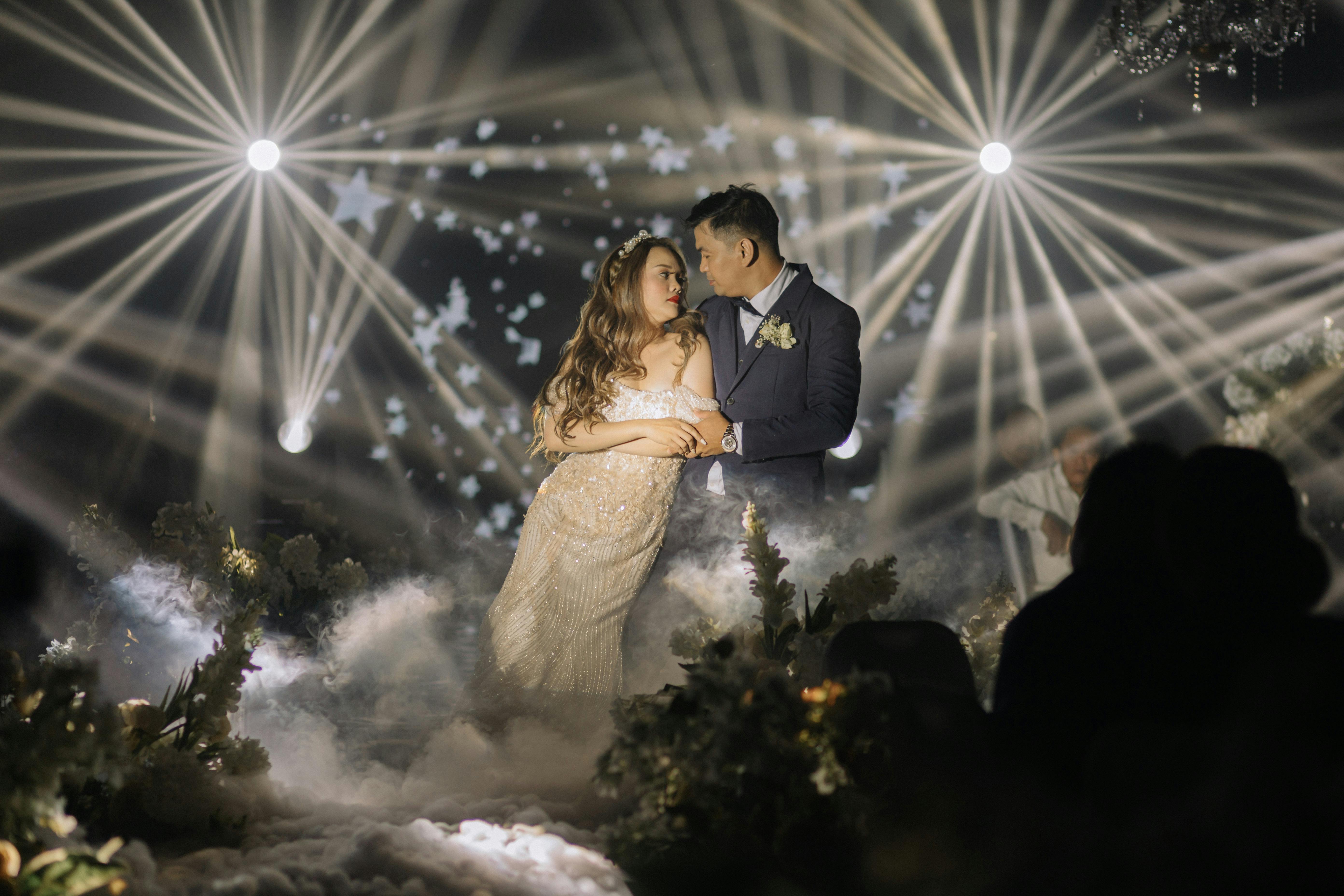 Wedding Couple Illuminated by Spotlights · Free Stock Photo
