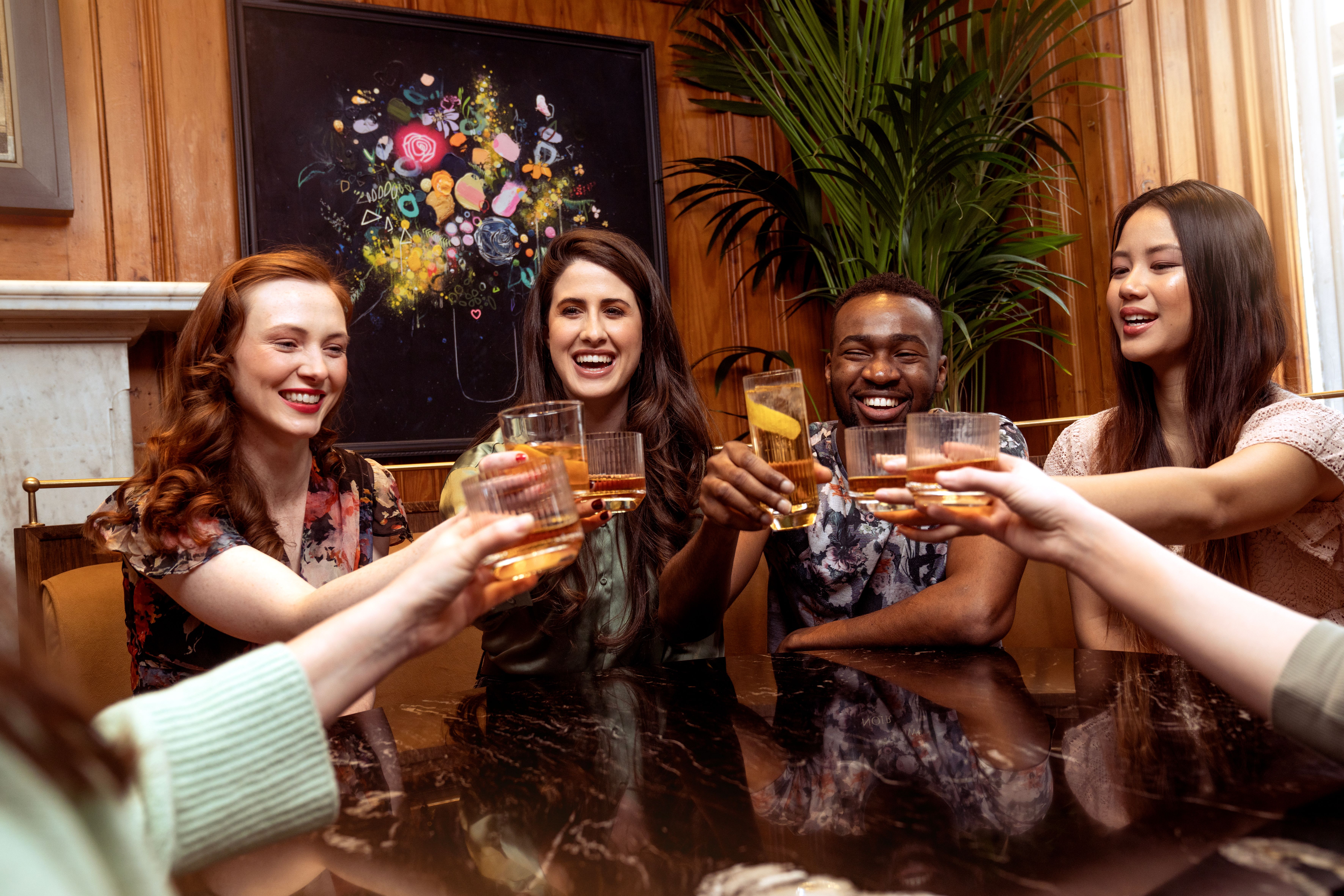 Group of Friends Making a Celebratory Toast · Free Stock Photo