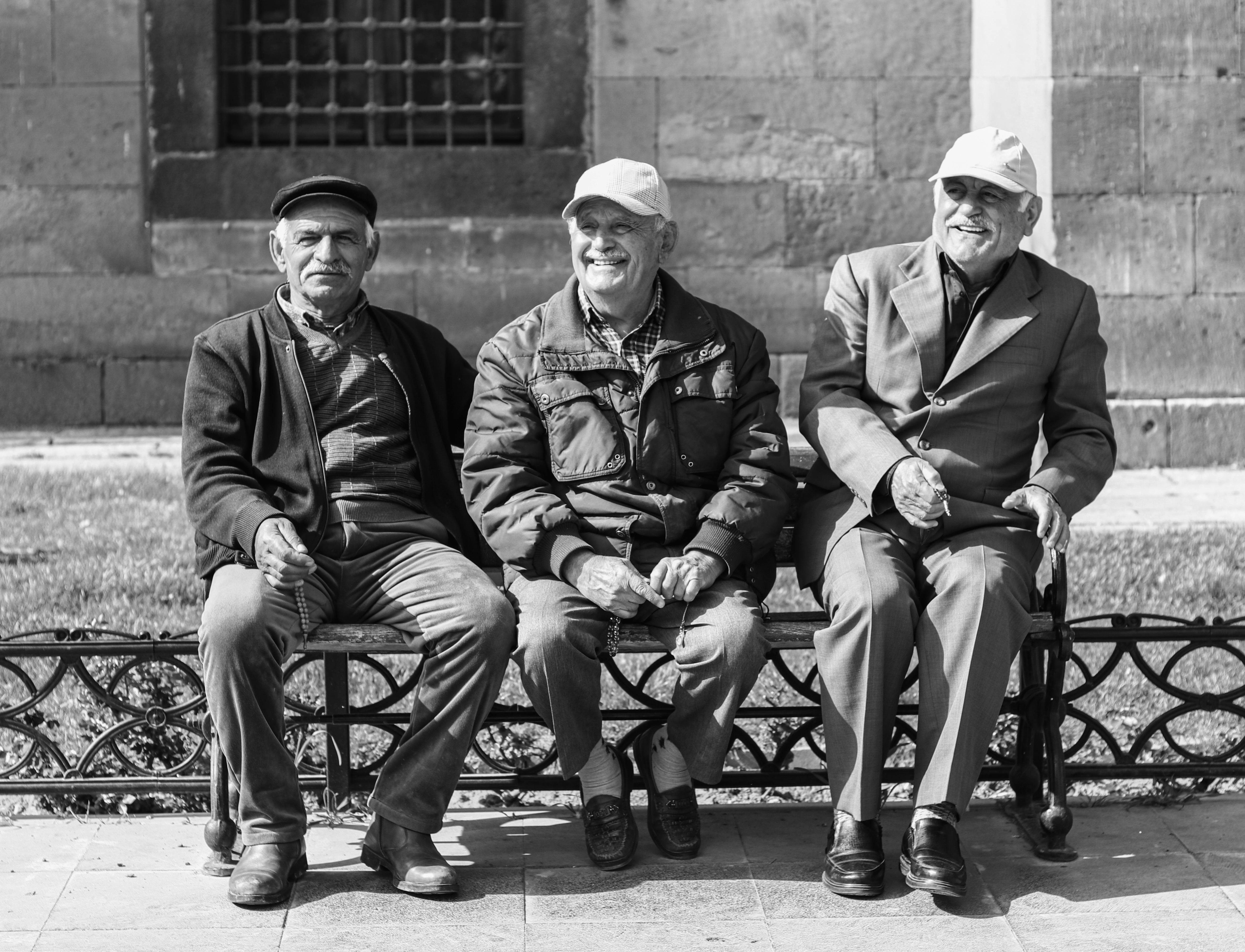Elderly Men Sitting on Bench and Talking · Free Stock Photo