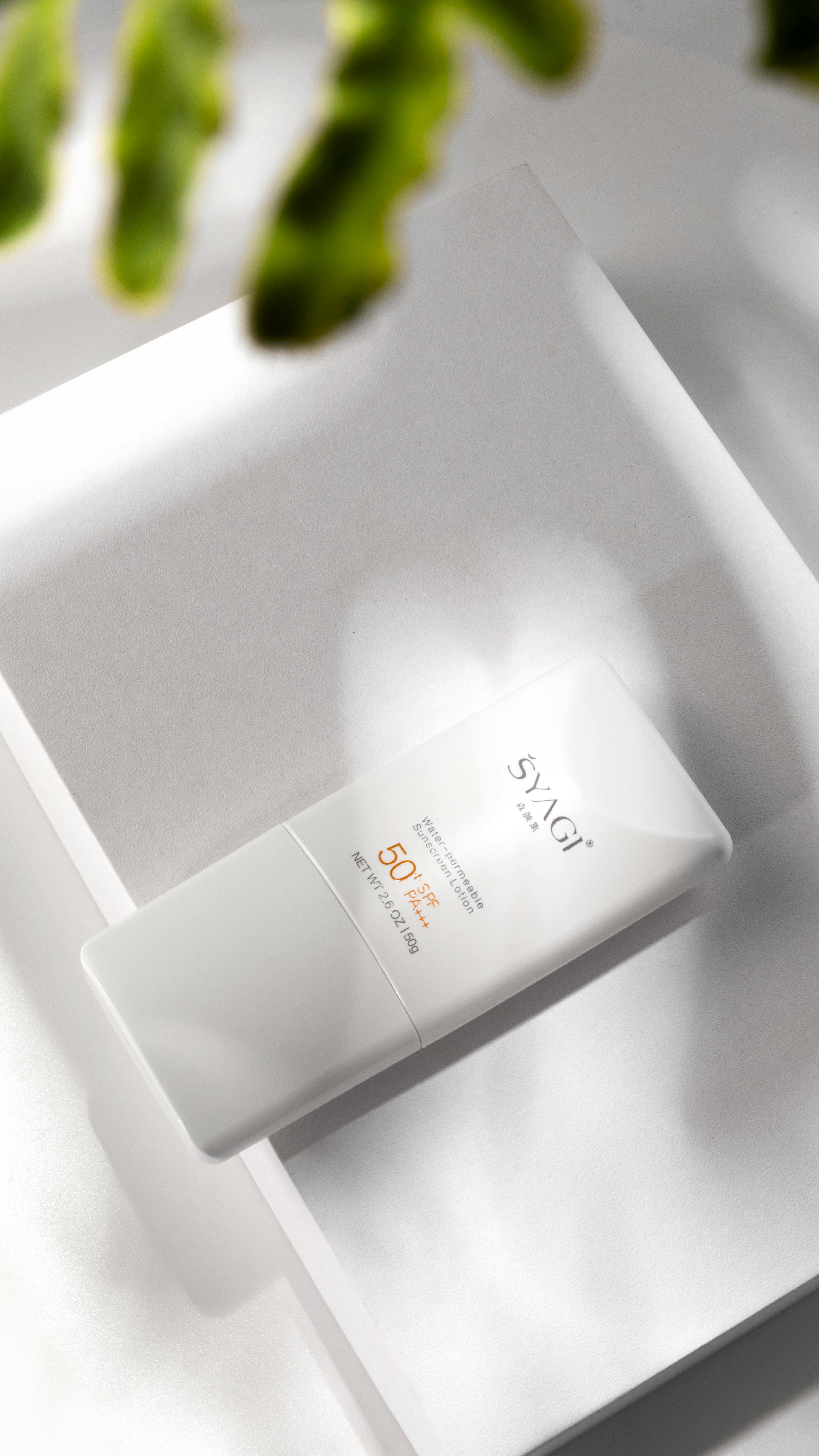 A Commercial Shot of SPF 50 Sunscreen · Free Stock Photo