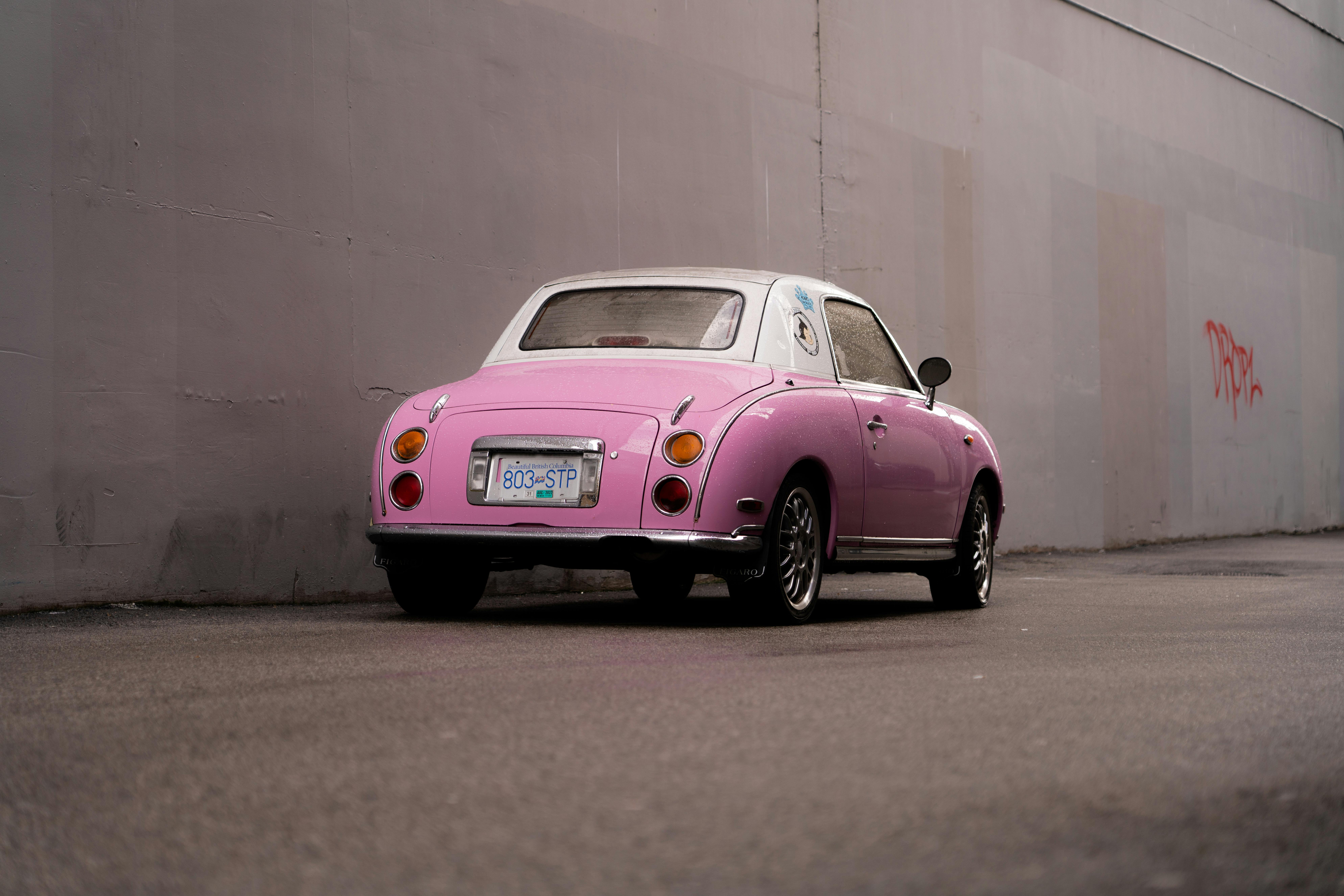 A Pink Nissan Figaro · Free Stock Photo