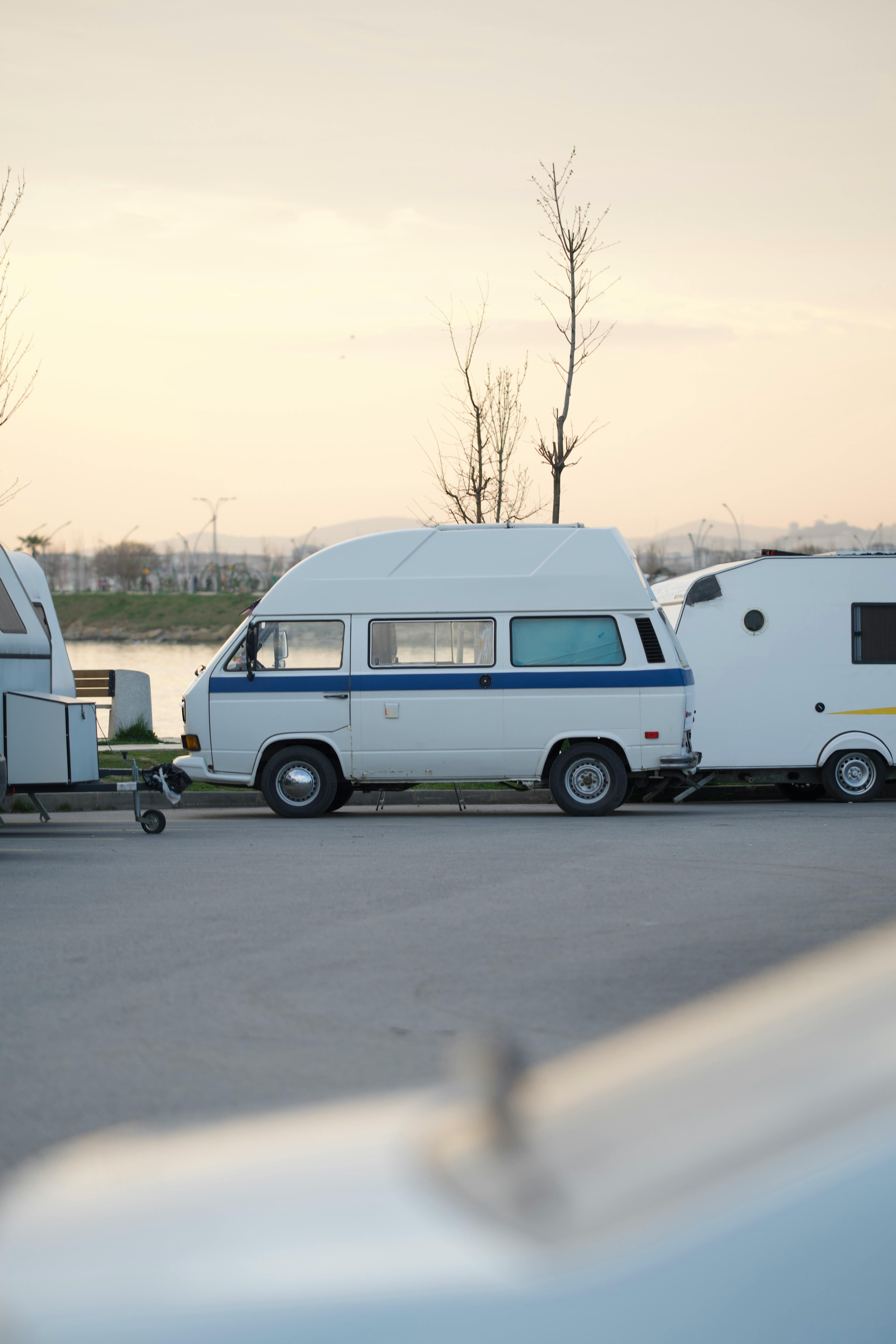 Campers Parked at Sunset · Free Stock Photo