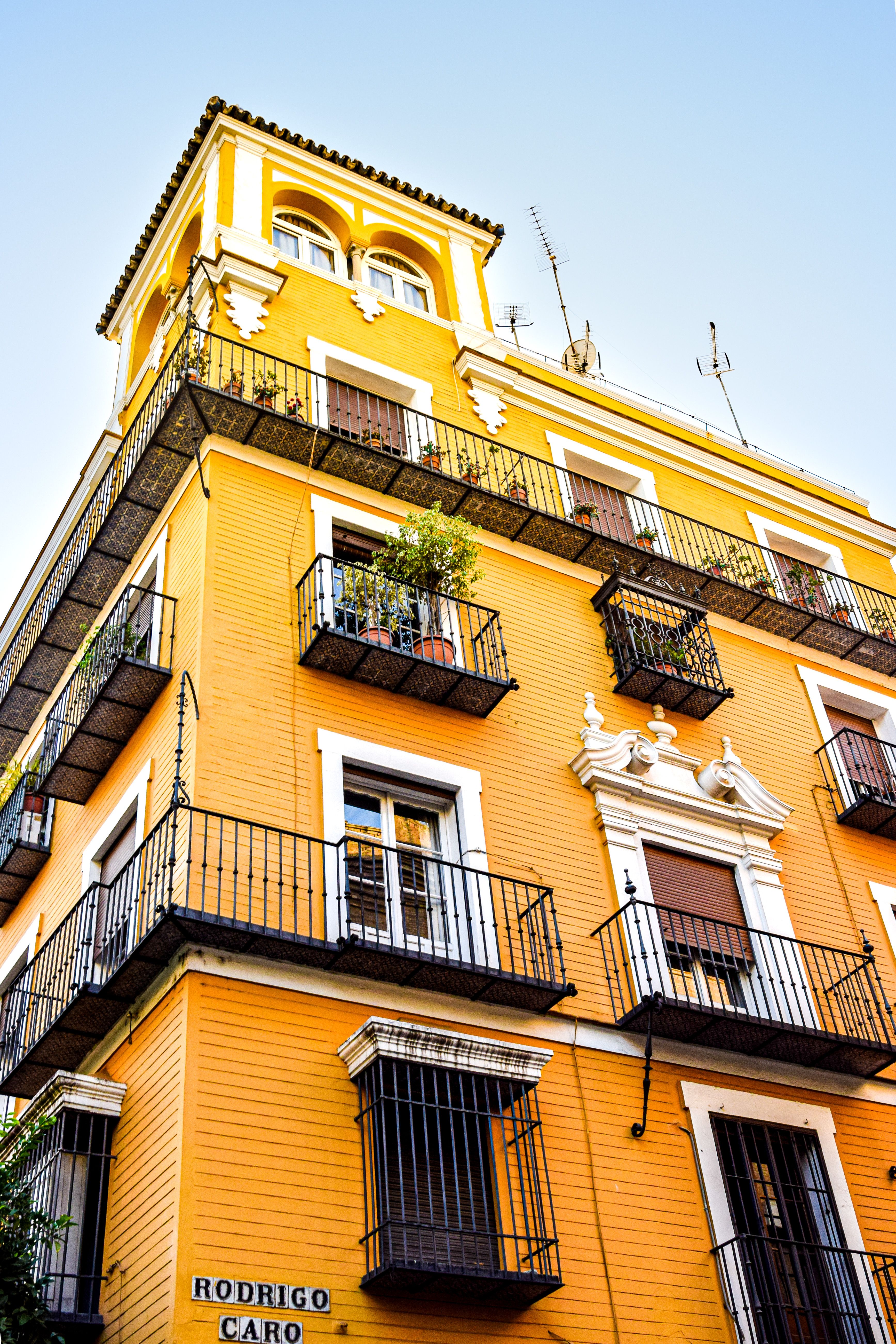 Yellow Wall of Building in Seville · Free Stock Photo