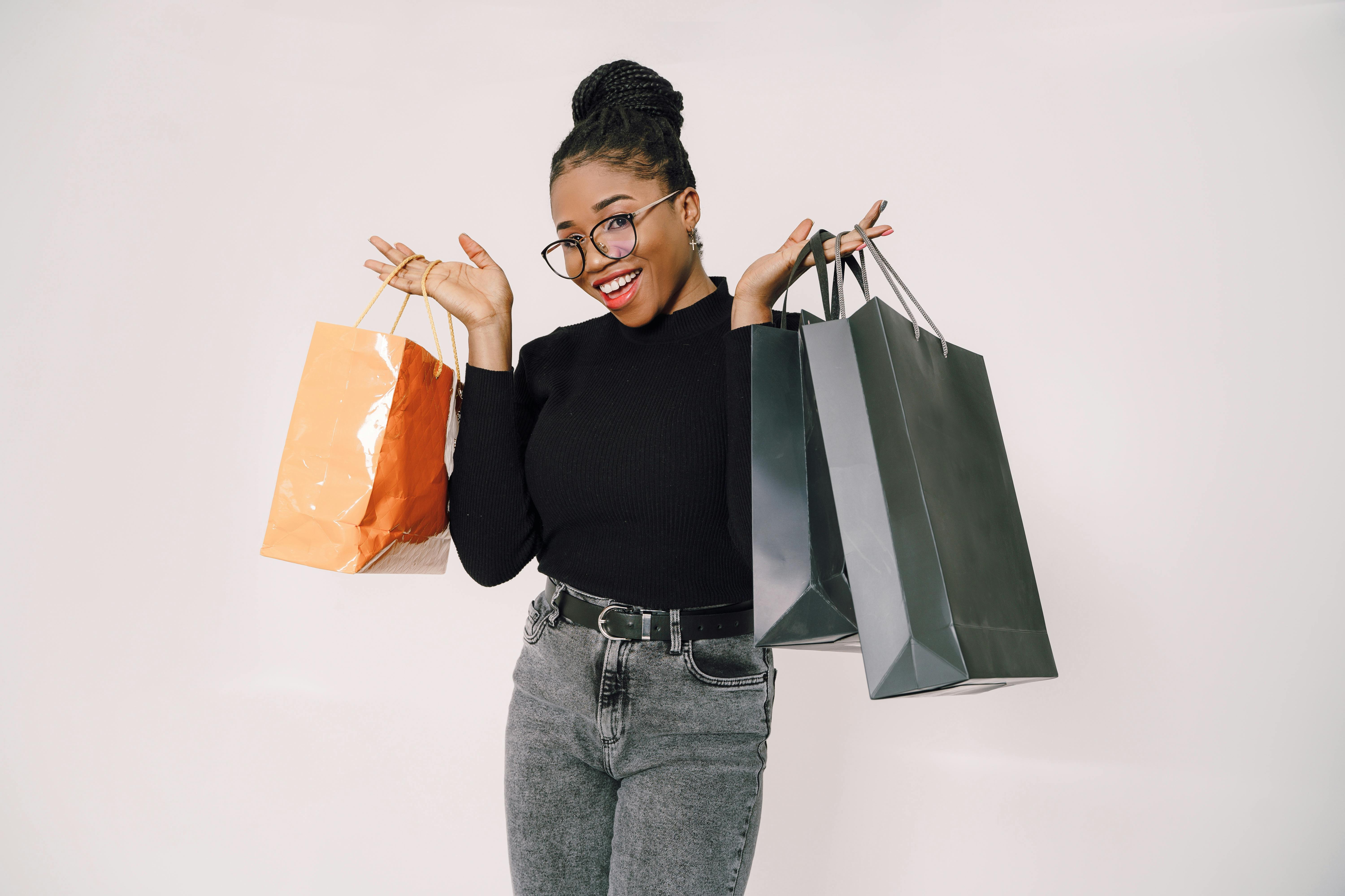Smiling Woman Posing with Bag · Free Stock Photo