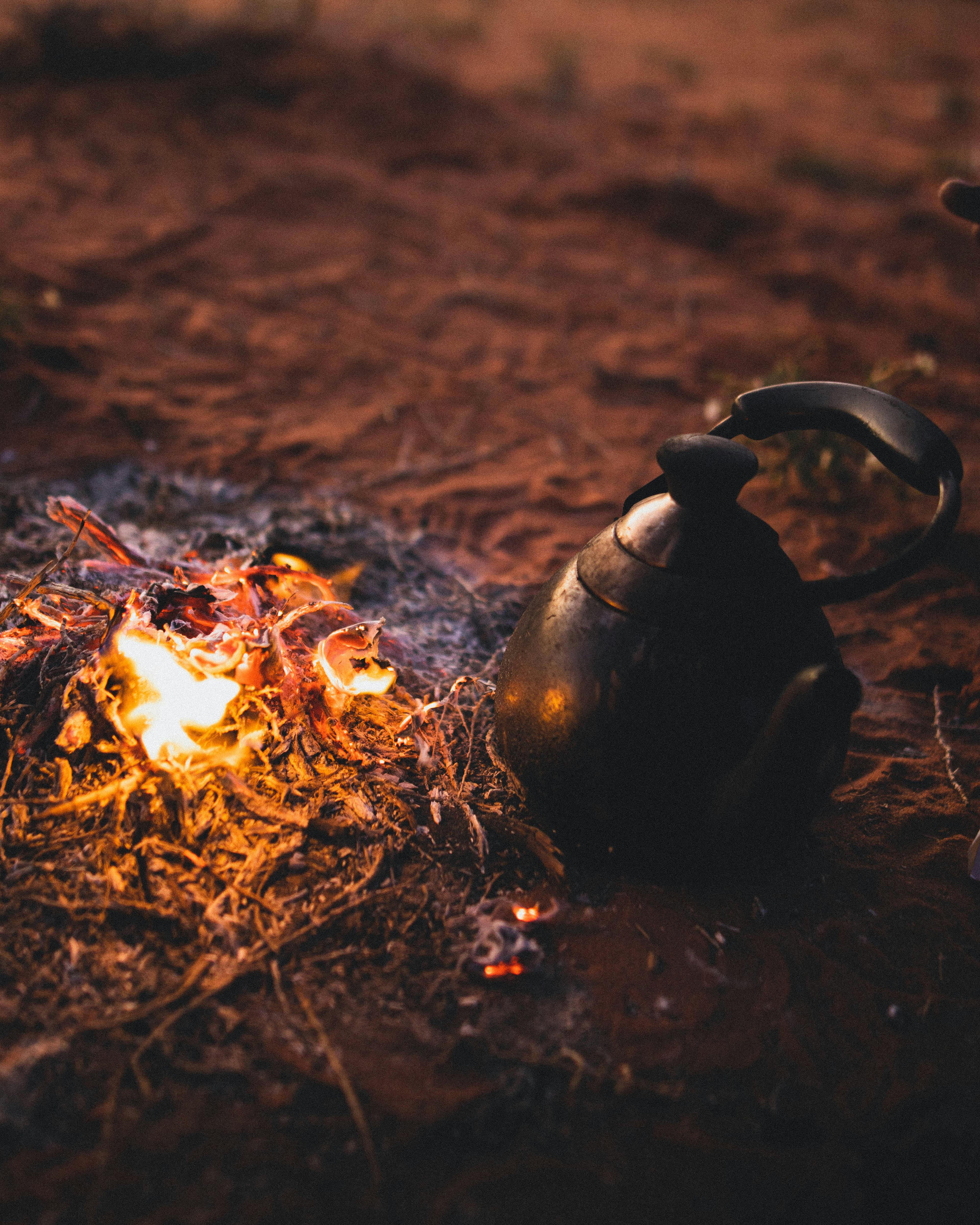 Kettle near Bonfire · Free Stock Photo