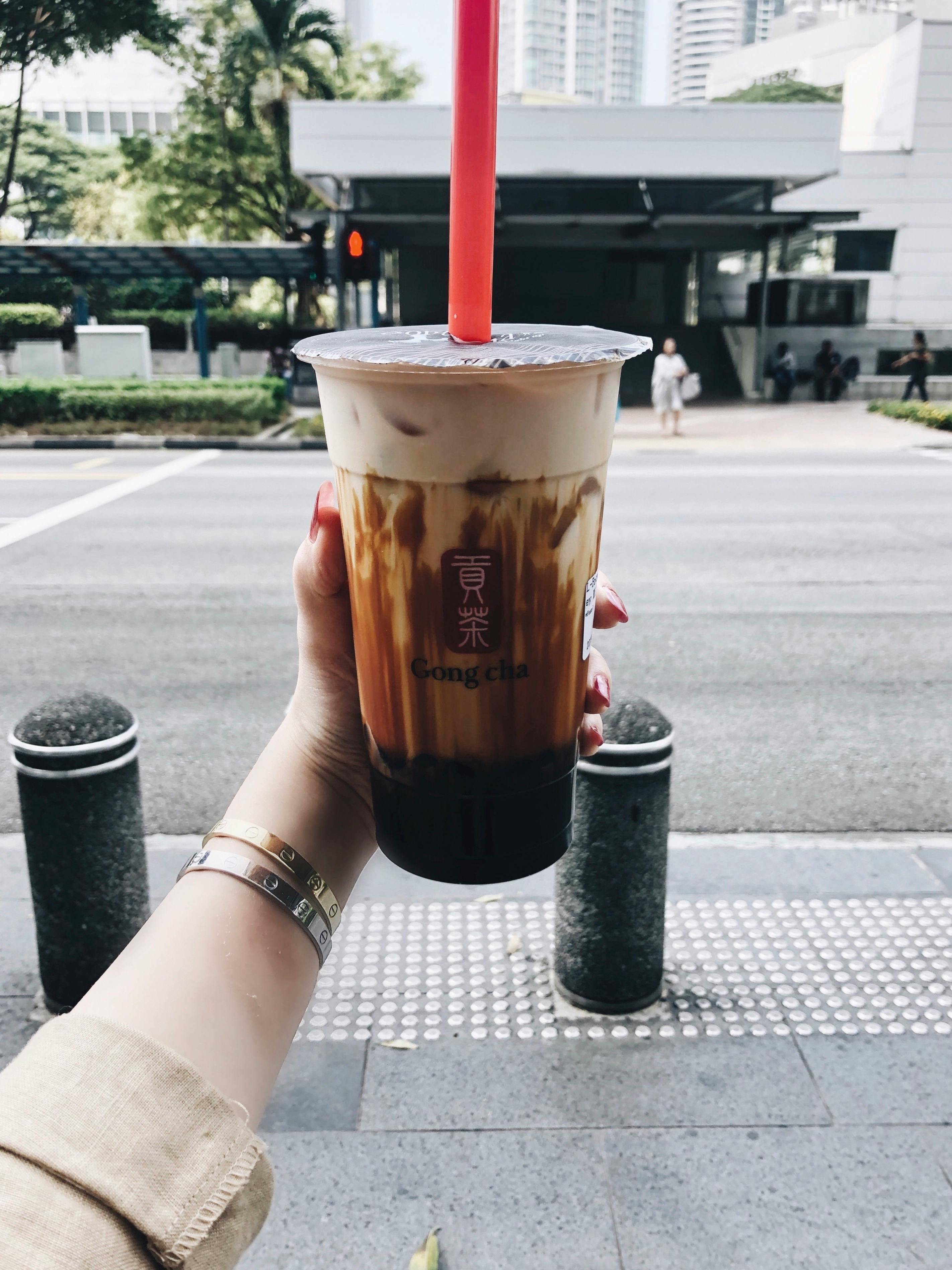 A Person Holding a Milk Tea · Free Stock Photo