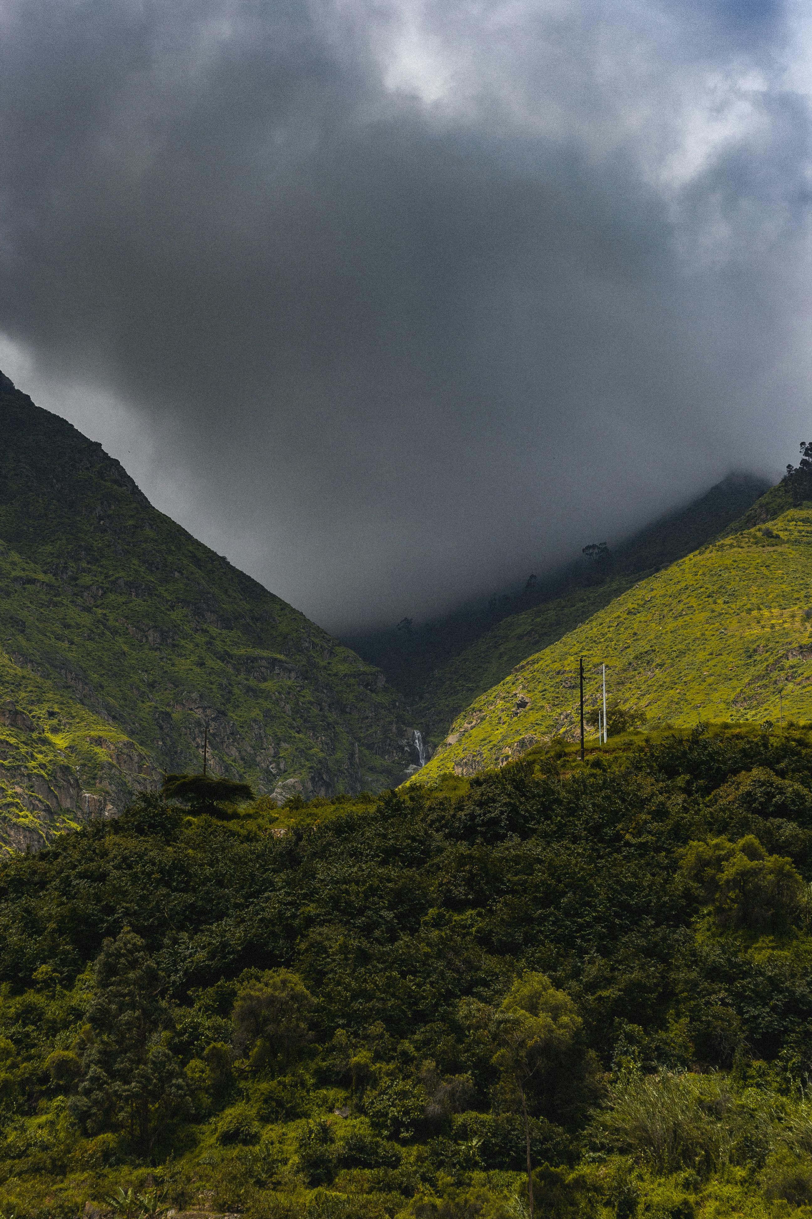 Rain Cloud over Green Valley · Free Stock Photo