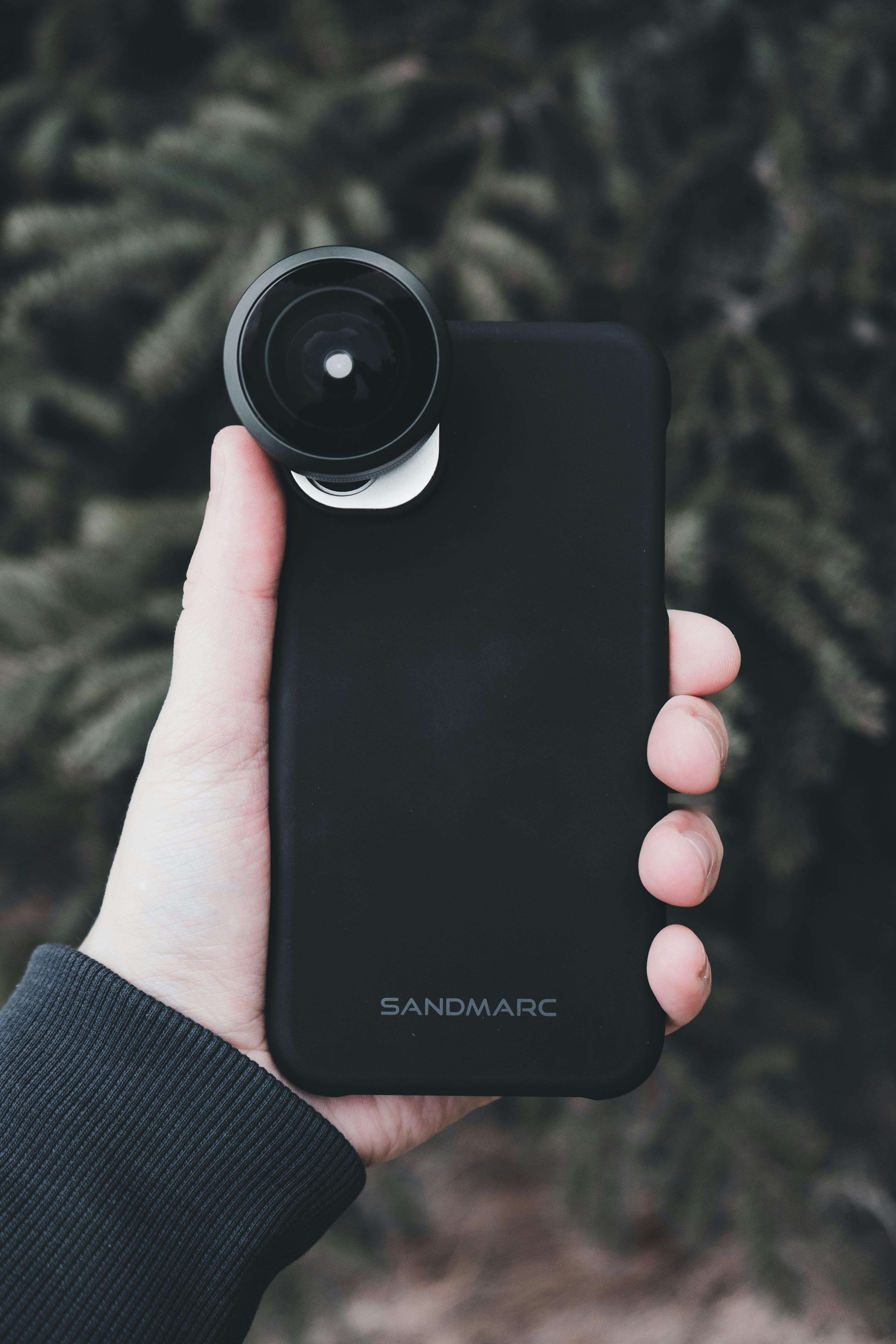 Black iPhone on Black Surface · Free Stock Photo